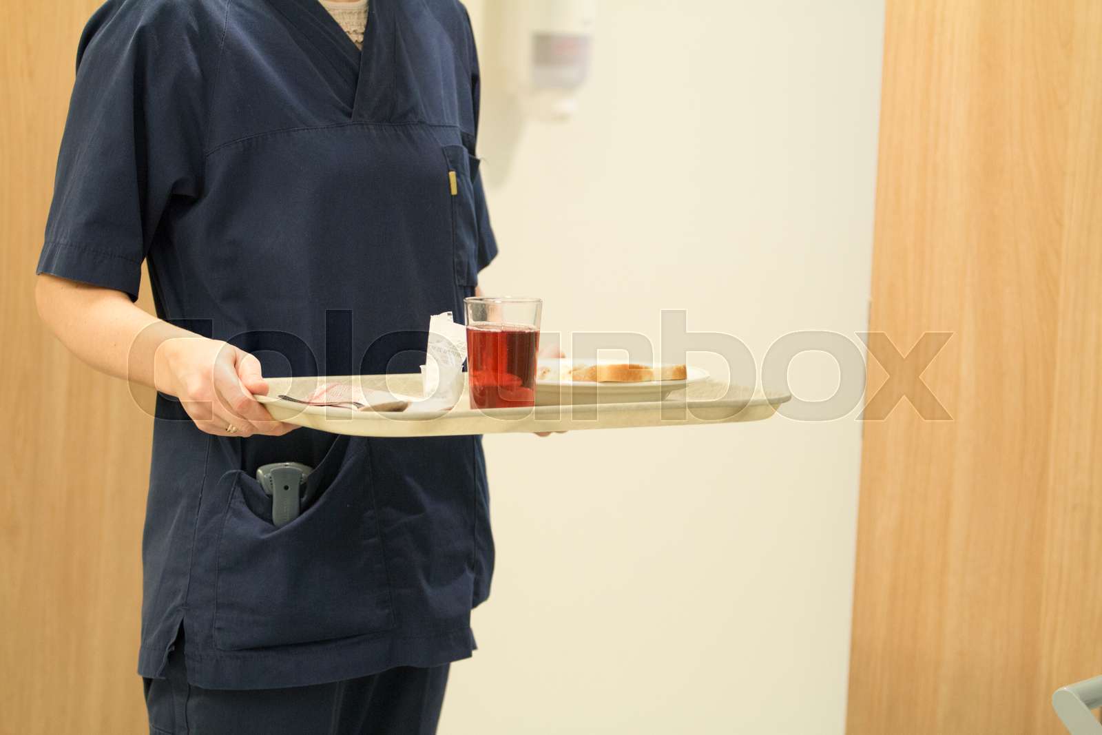 Nurse Serving Lunch | Stock image | Colourbox