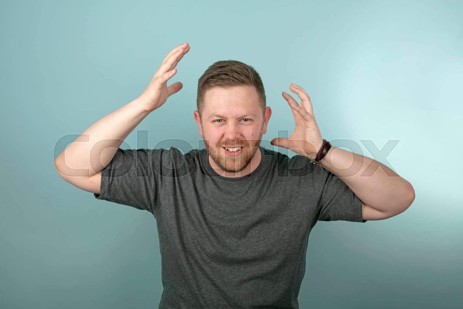Frustrated angry man snarling and gesturing | Stock image | Colourbox