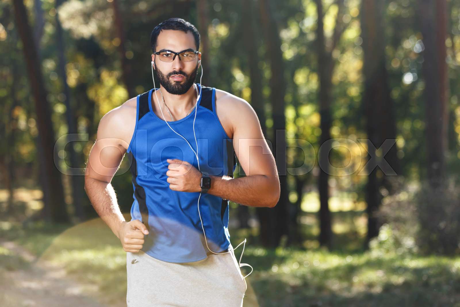 Athletic Bearded Man Jogging On The Park | Stock image | Colourbox