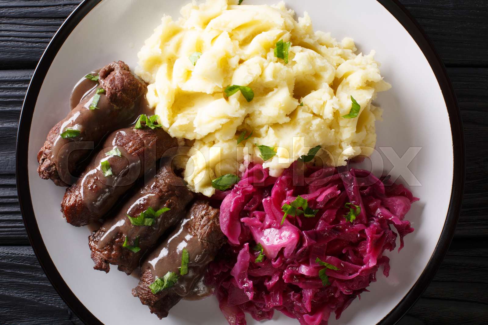 Beef Rouladen or Rinderrouladen German classic dish served with mashed ...