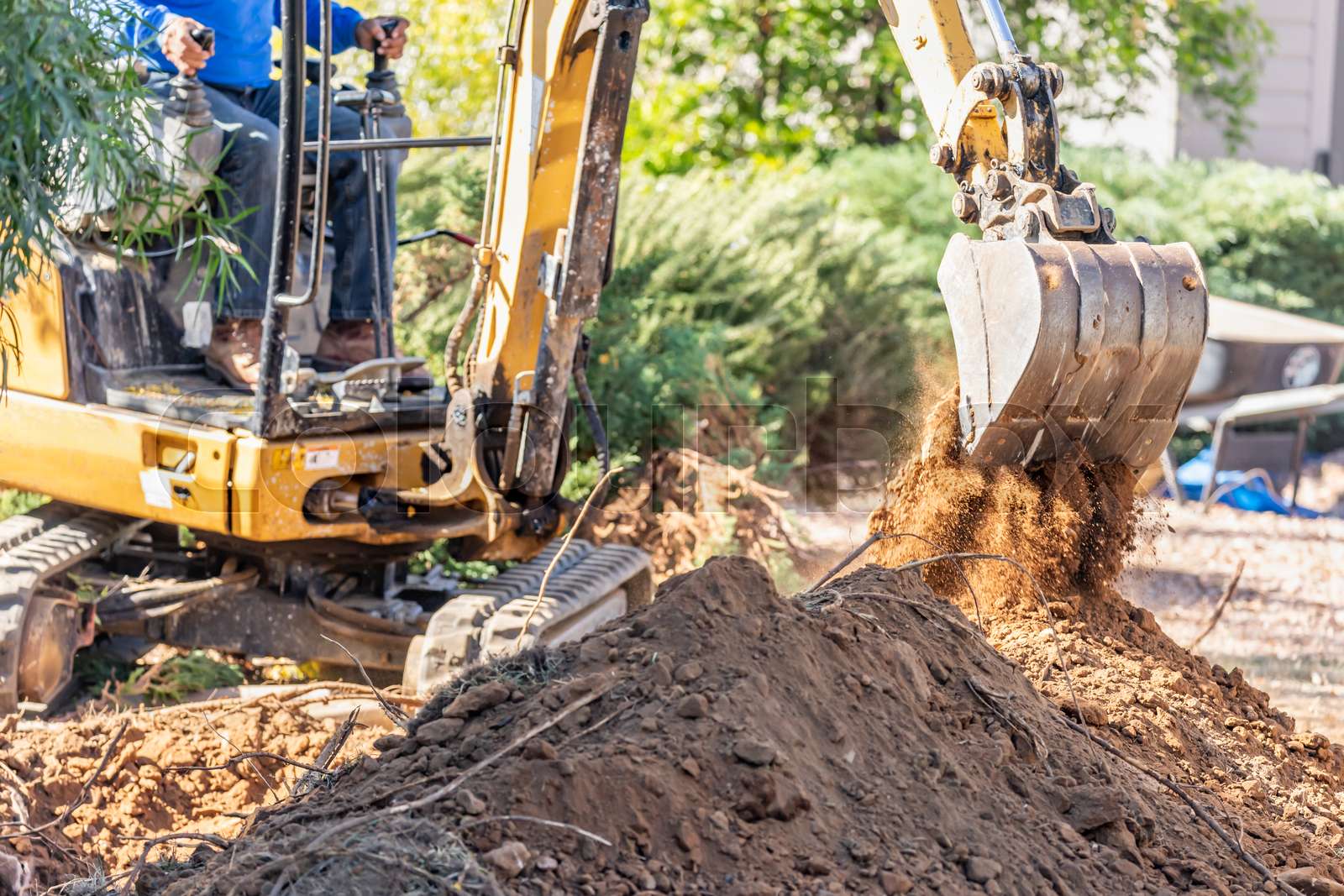 Working Excavator Tractor Digging A Trench At Construction Site | Stock ...