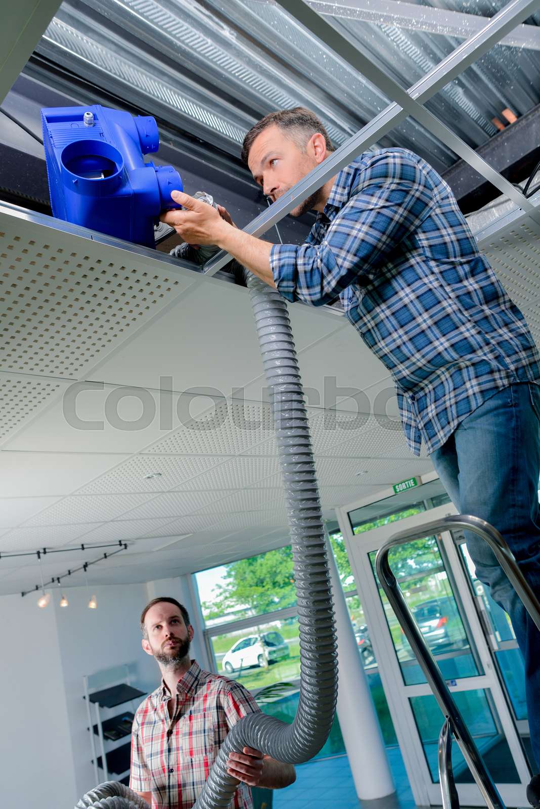 installing the ventilation box | Stock image | Colourbox