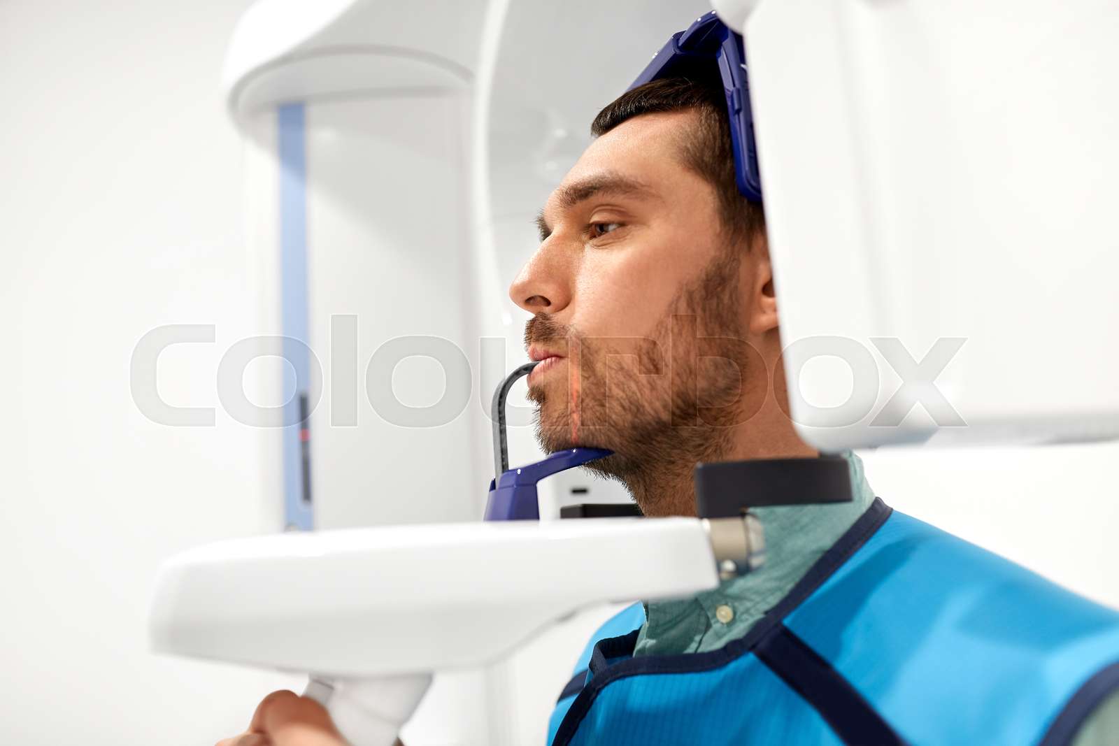 patient having x-ray scanning at dental clinic | Stock image | Colourbox