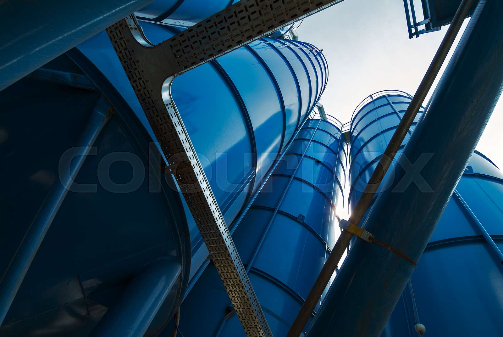 View from below of Tower Silos Bulk Storage | Stock image | Colourbox