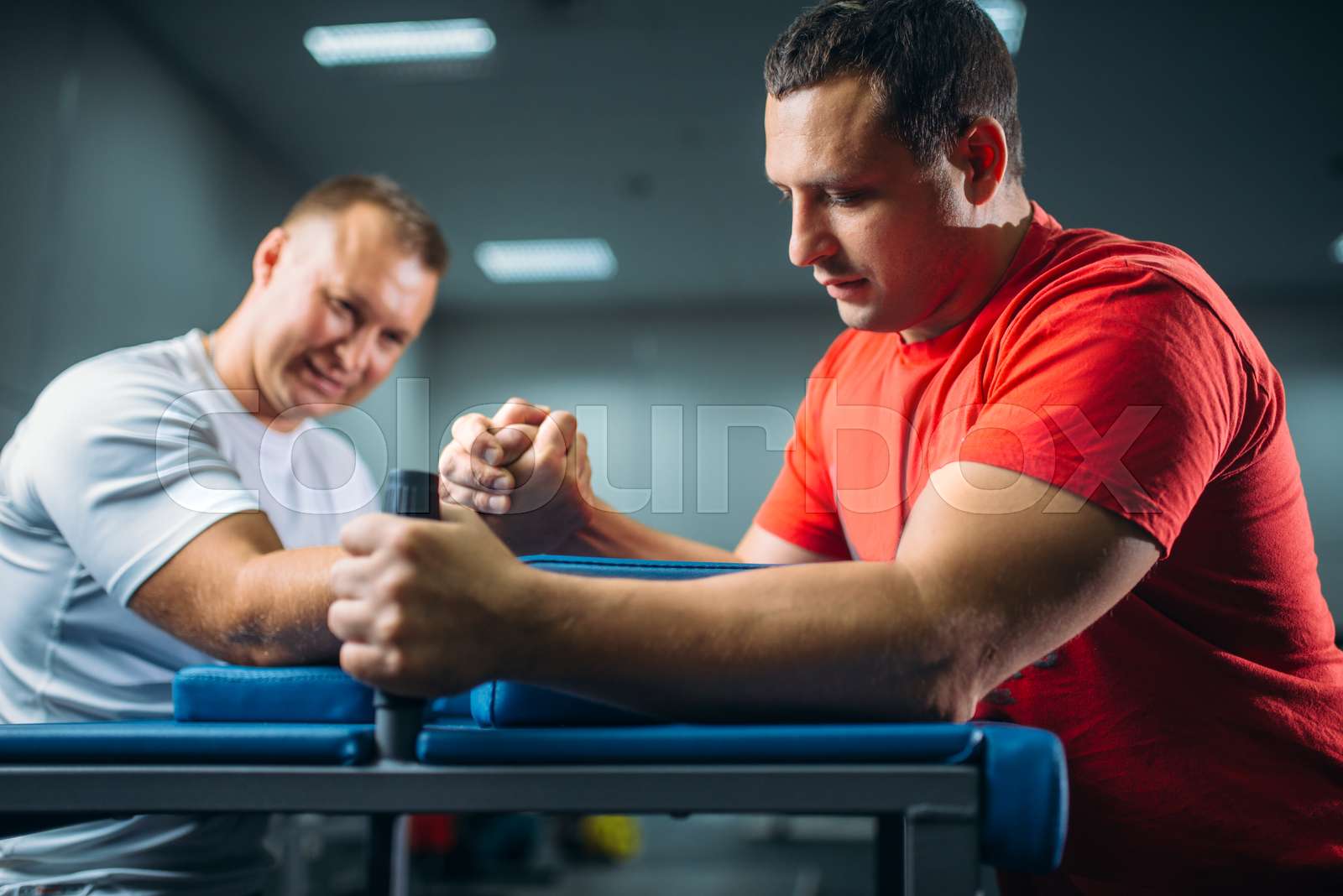 Two arm wrestlers fighting on their hands | Stock image | Colourbox