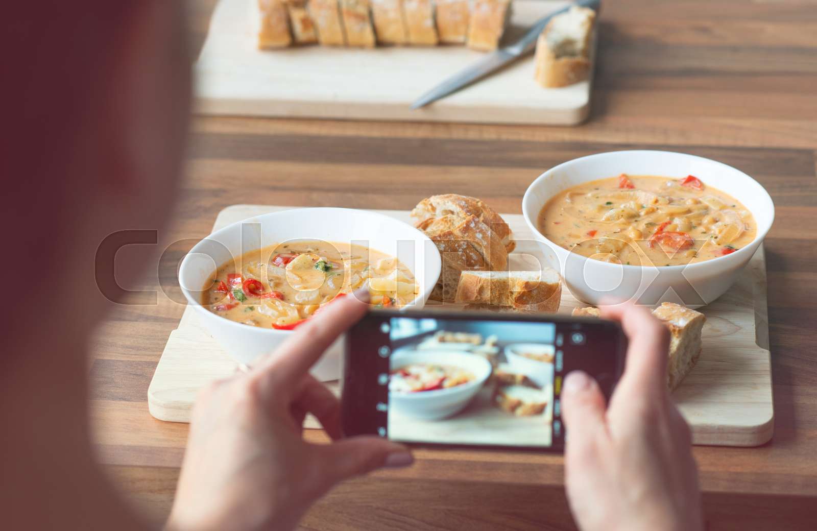 Closeup womans hands photographing vegetarian dish at health food ...