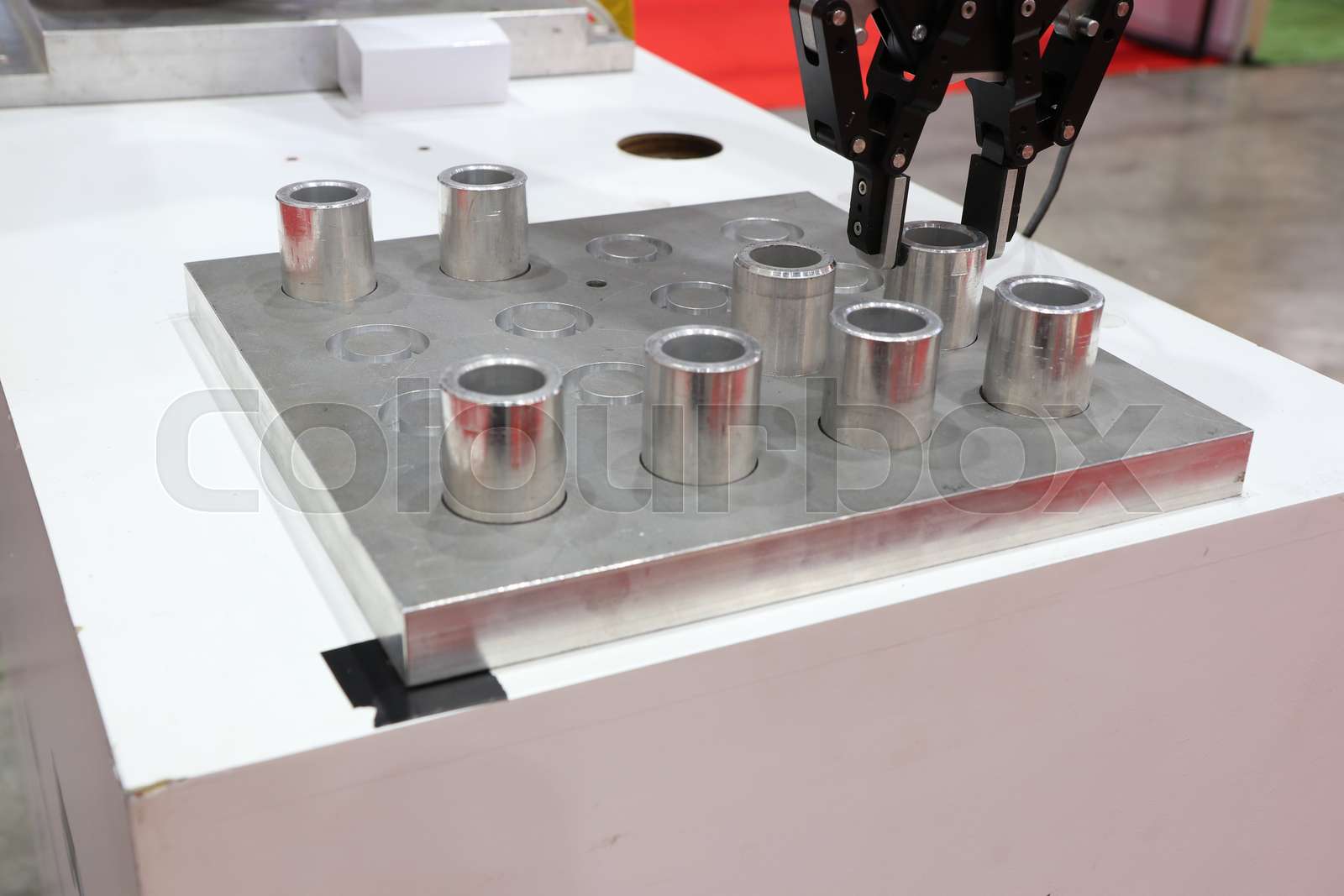 Robotic arm clamp sample and transfer in metal plate | Stock image ...