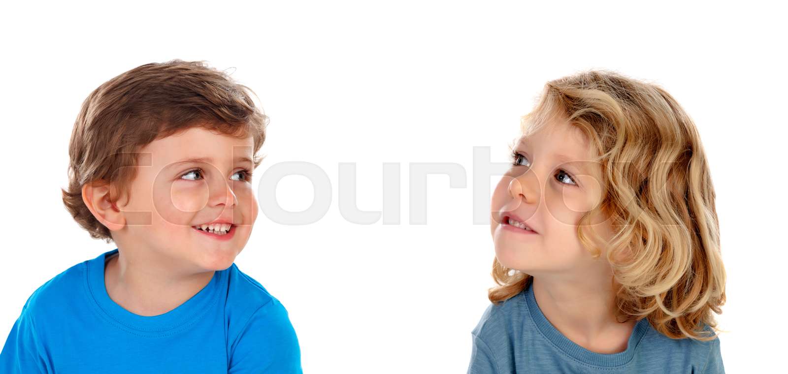 Two blond children looking up | Stock image | Colourbox