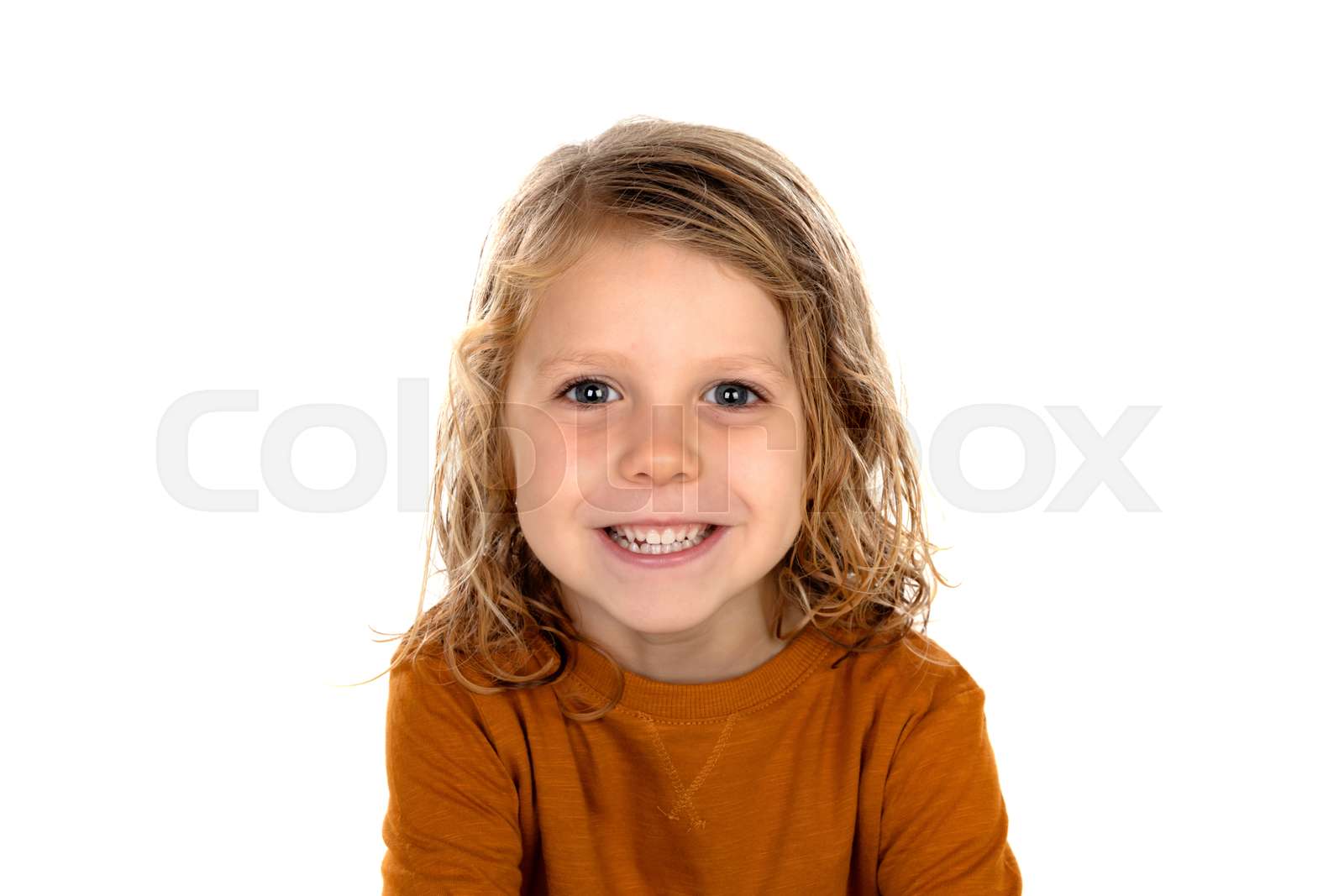 Happy blond child with long hair | Stock image | Colourbox