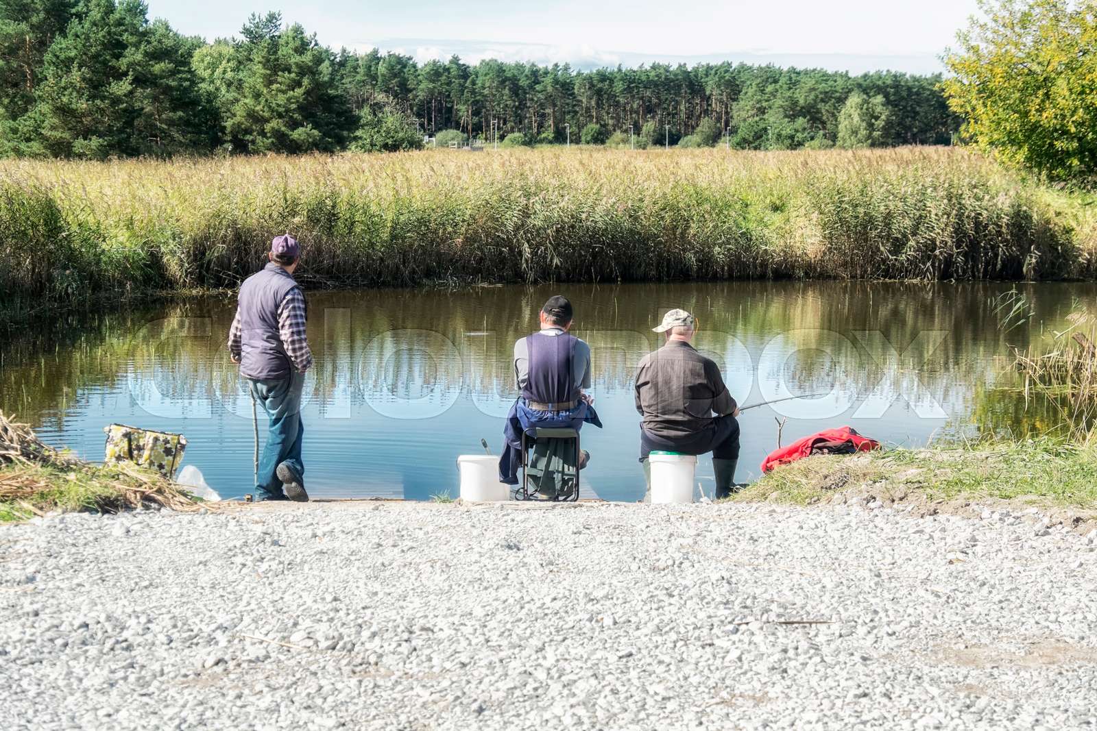 three fishers take fish | Stock image | Colourbox
