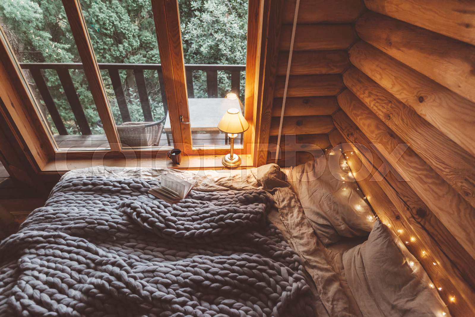 Cozy winter weekend in log cabin | Stock image | Colourbox