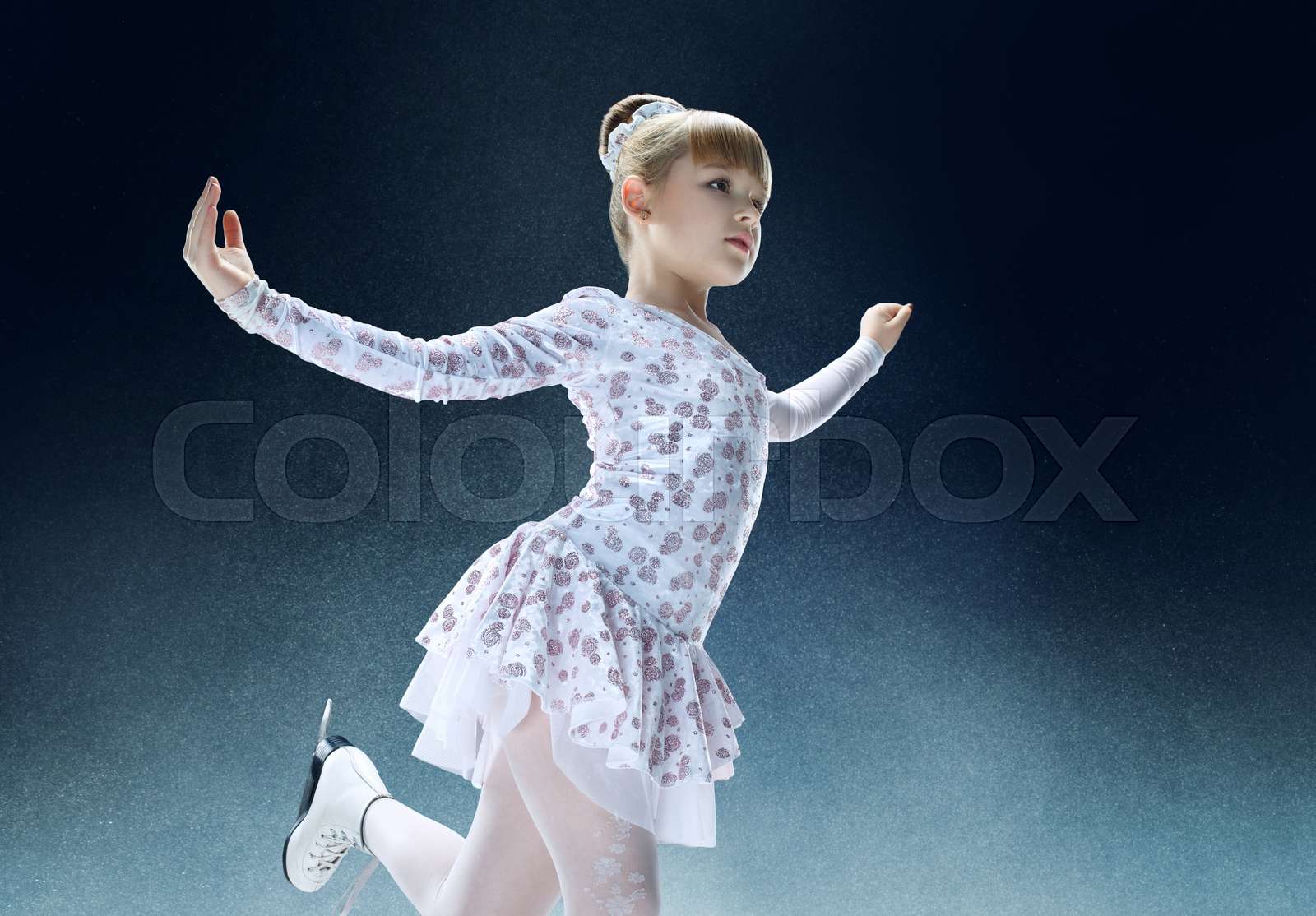 Little girl figure skating at the indoor ice arena. | Stock image ...