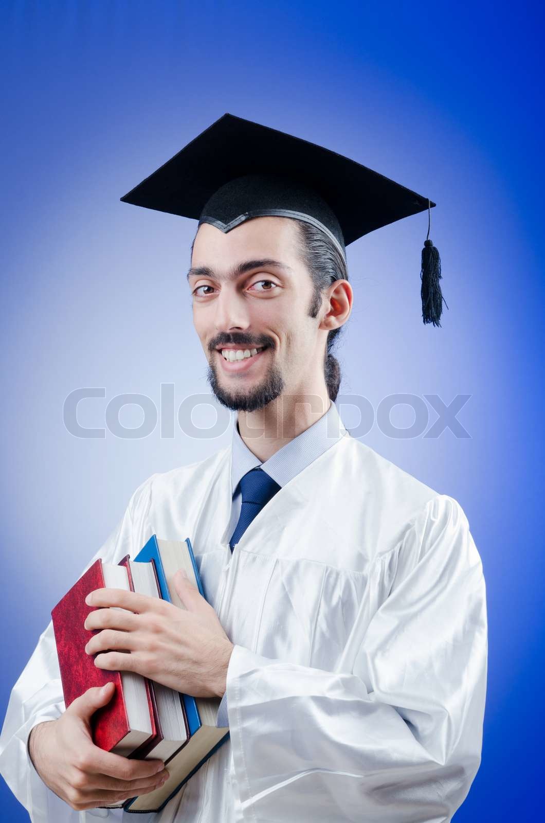Young male student graduate | Stock image | Colourbox