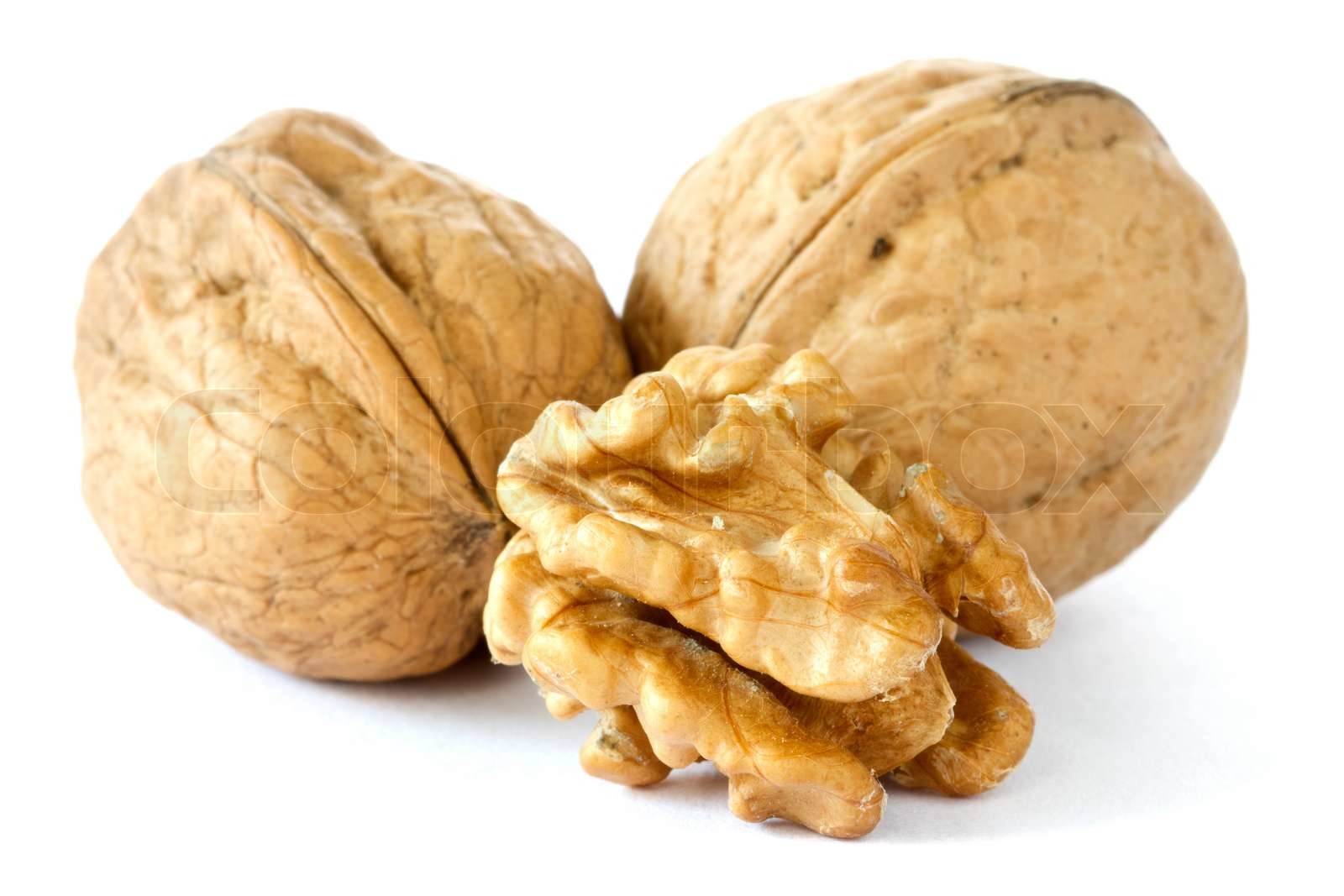 three dried walnuts | Stock image | Colourbox