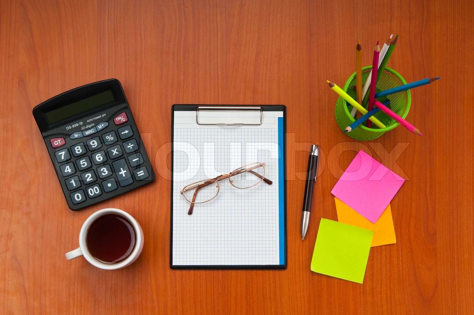 Desk top with many items | Stock image | Colourbox