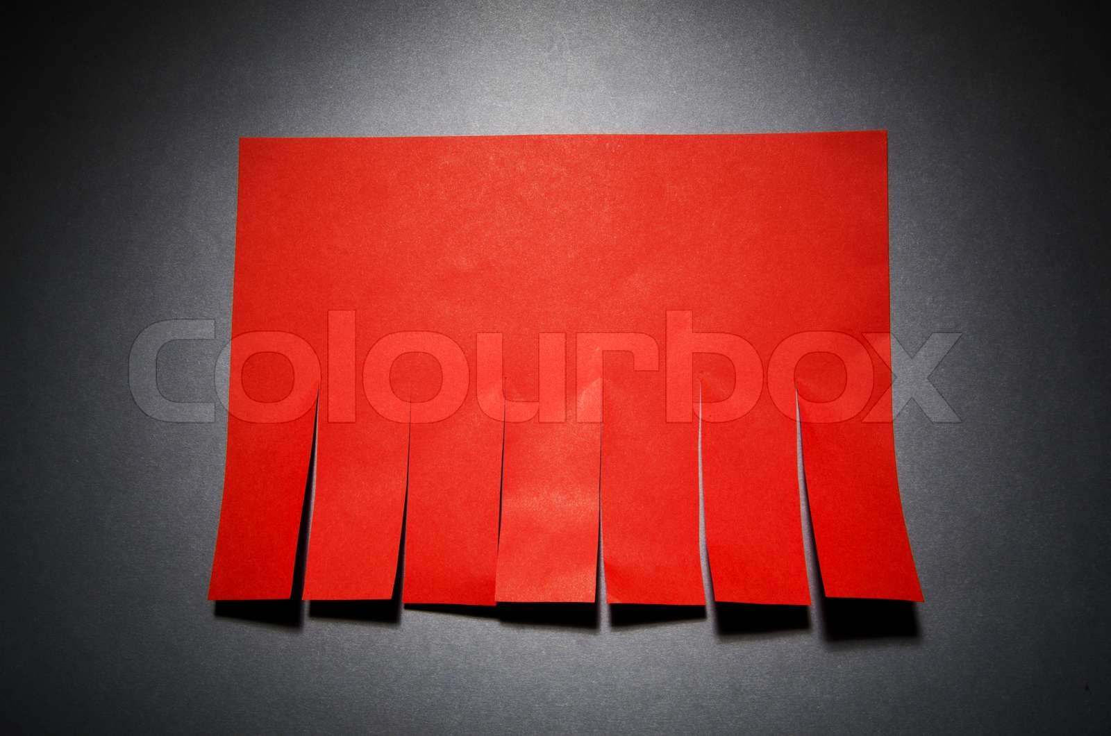 Tear off paper notice on the wall | Stock image | Colourbox