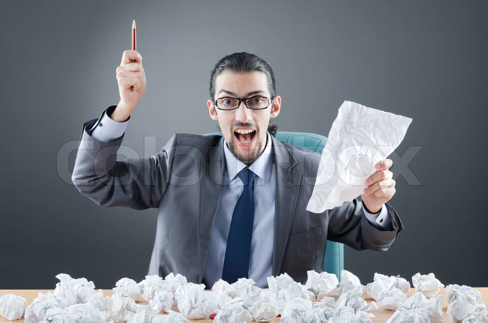 Businessman throwing paper away | Stock image | Colourbox