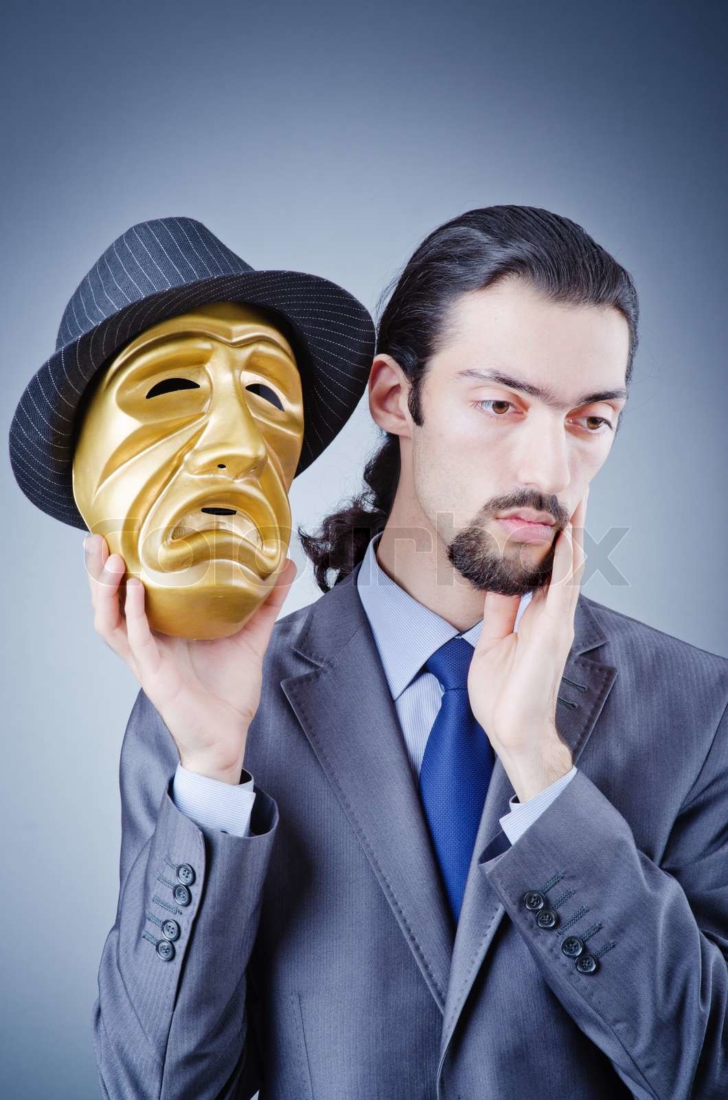 Businessman with mask concealing his identity | Stock image | Colourbox