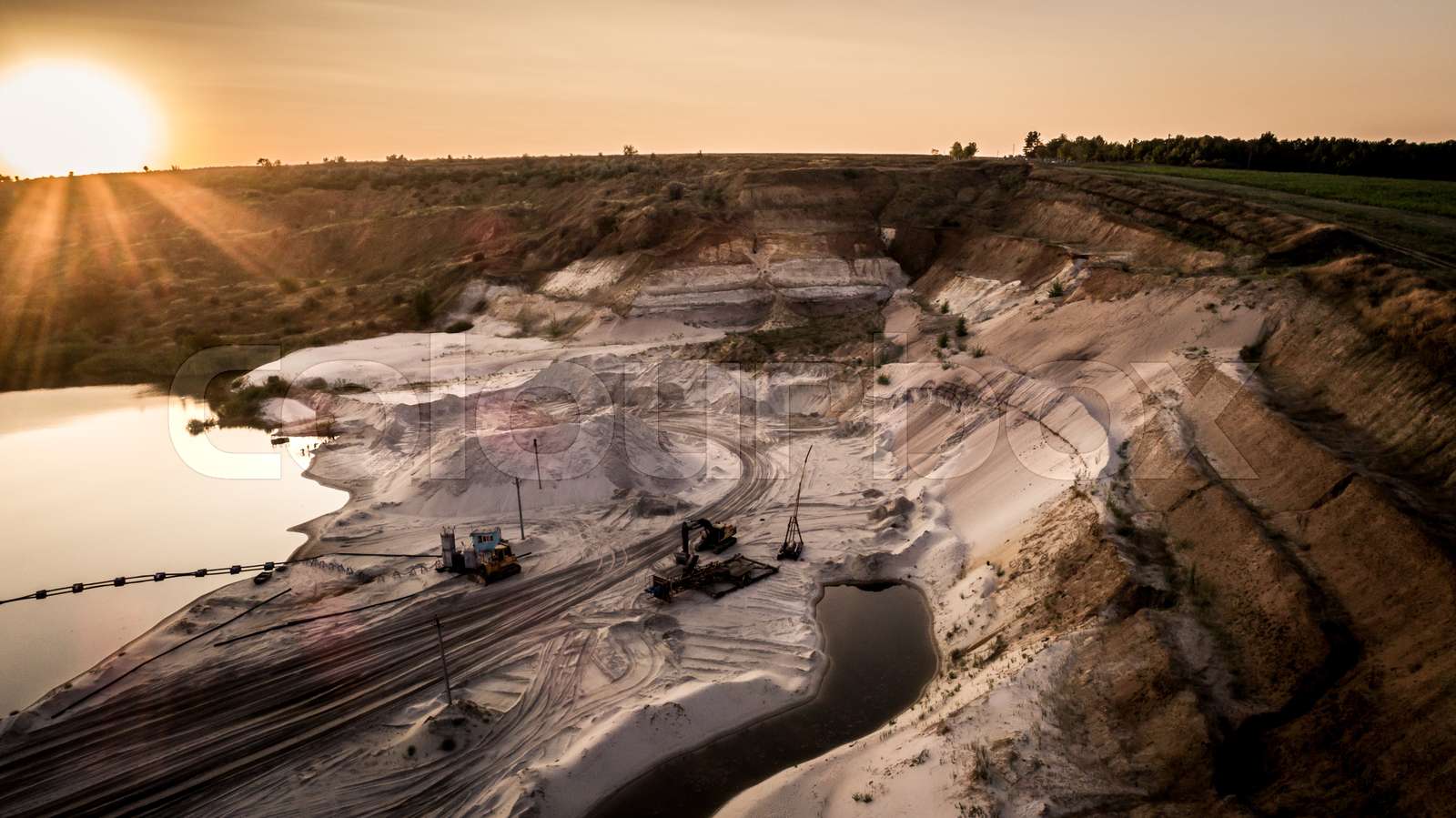 Aerial view of sandy quarry surface and mine equipment | Stock image ...