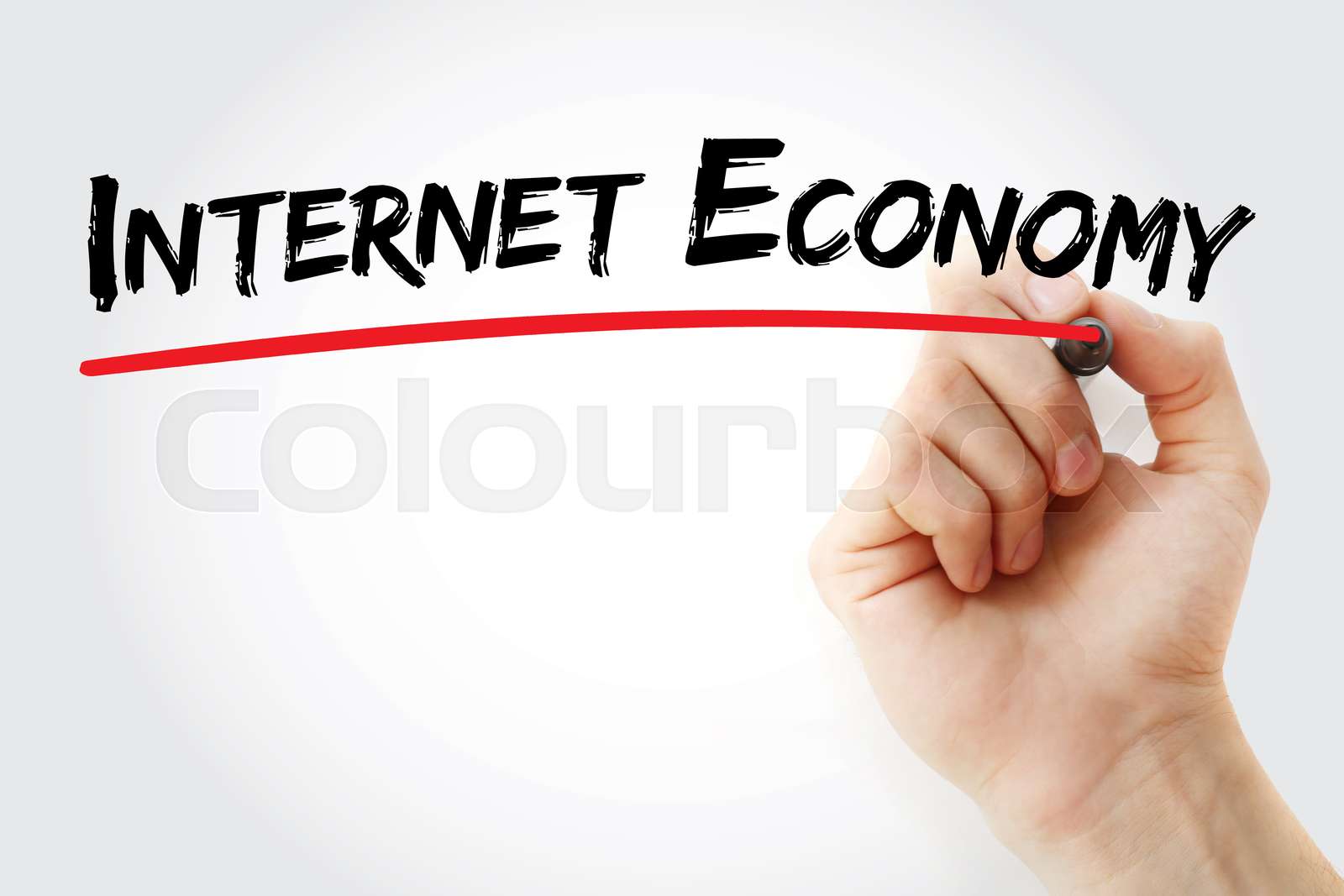 Hand writing Internet economy with marker | Stock image | Colourbox