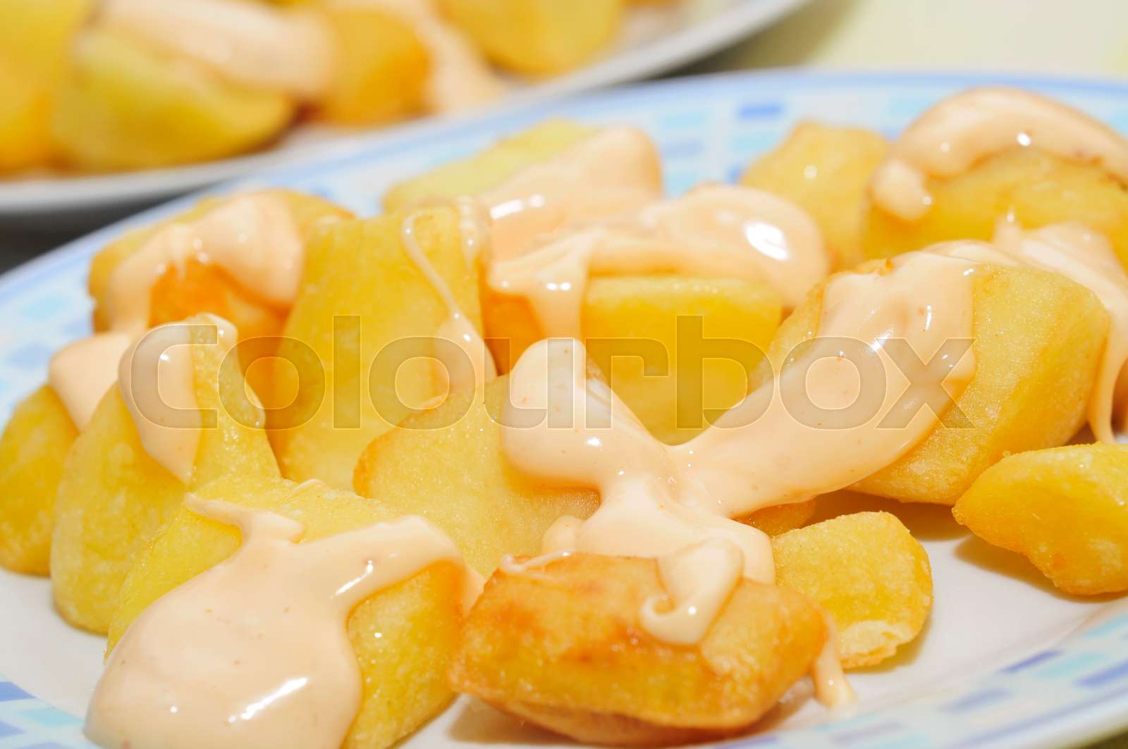 typical spanish patatas bravas, spicy potatoes | Stock image | Colourbox
