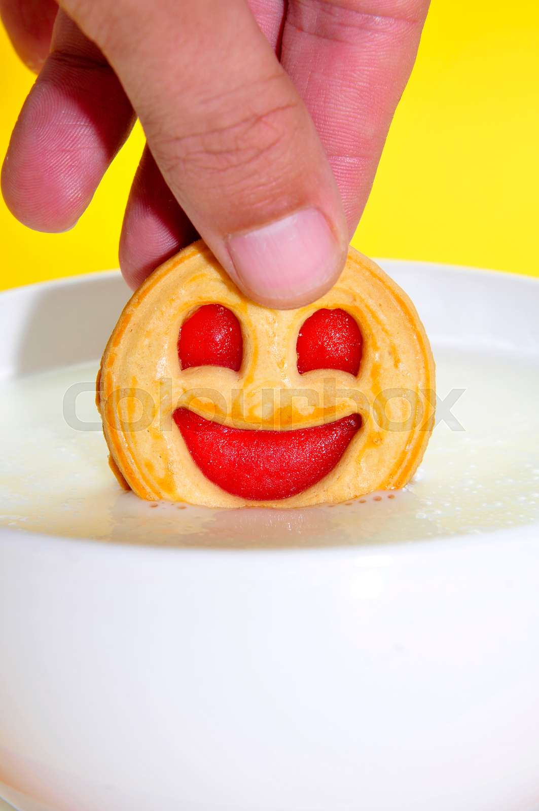 smiley face biscuit | Stock image | Colourbox