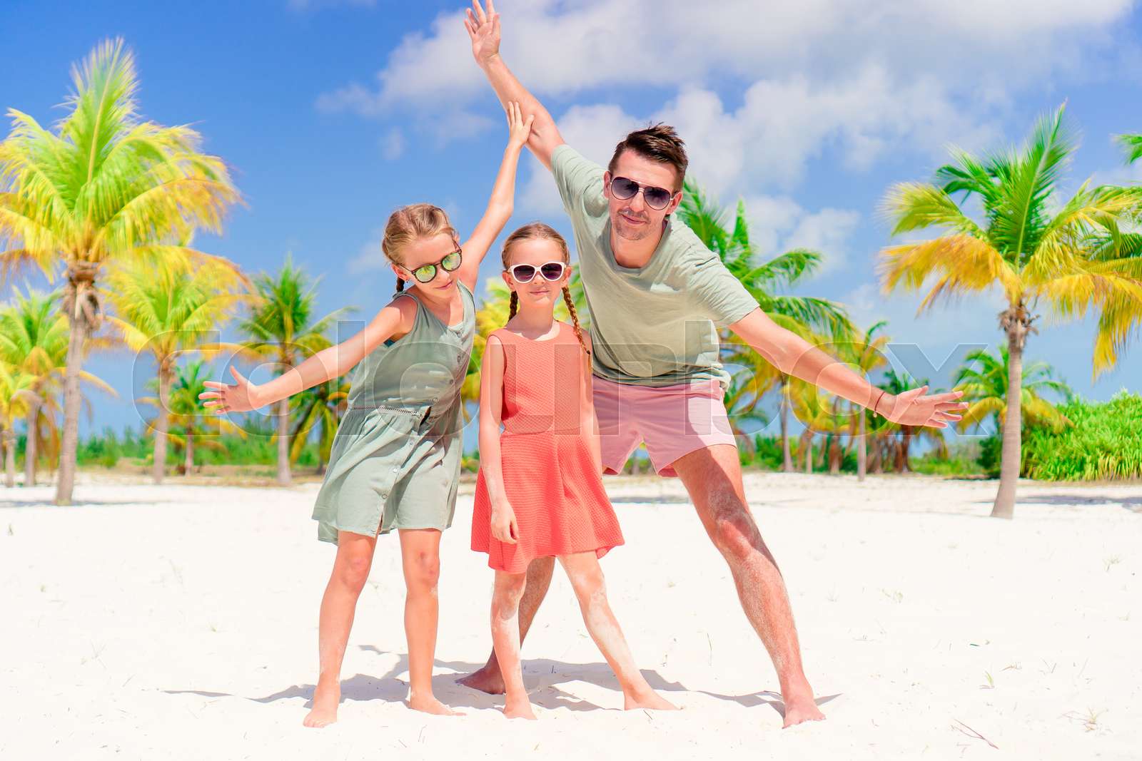 Father and kids enjoying beach summer vacation | Stock image | Colourbox