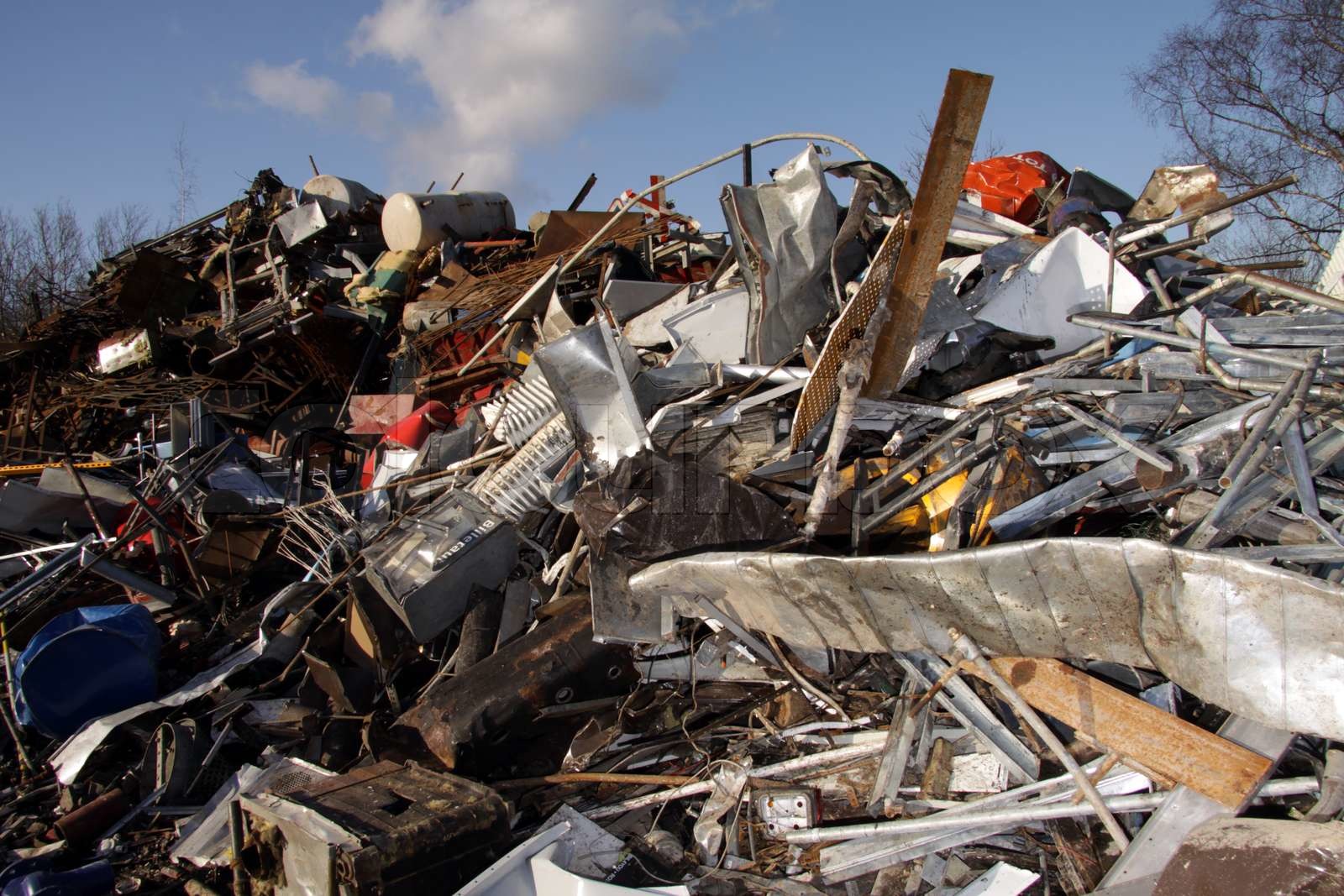A huge pile of metal waste at a recycling center | Stock image | Colourbox
