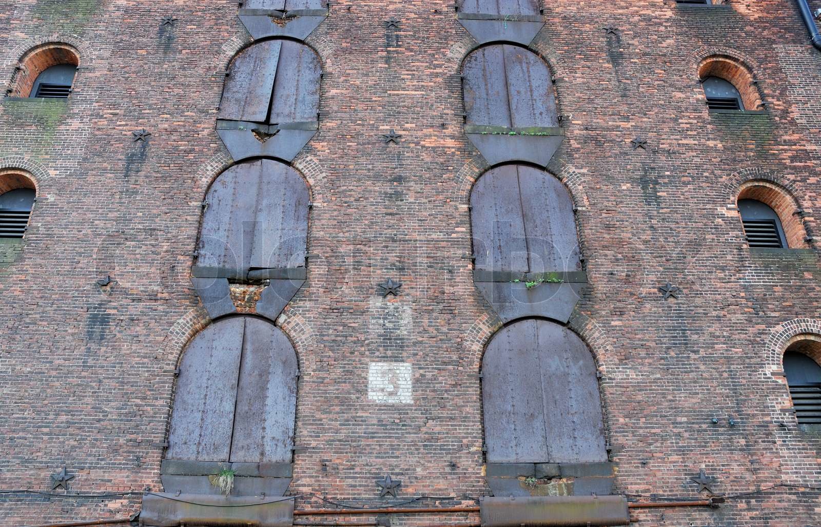 An old brick warehouse dockside, New York | Stock image | Colourbox