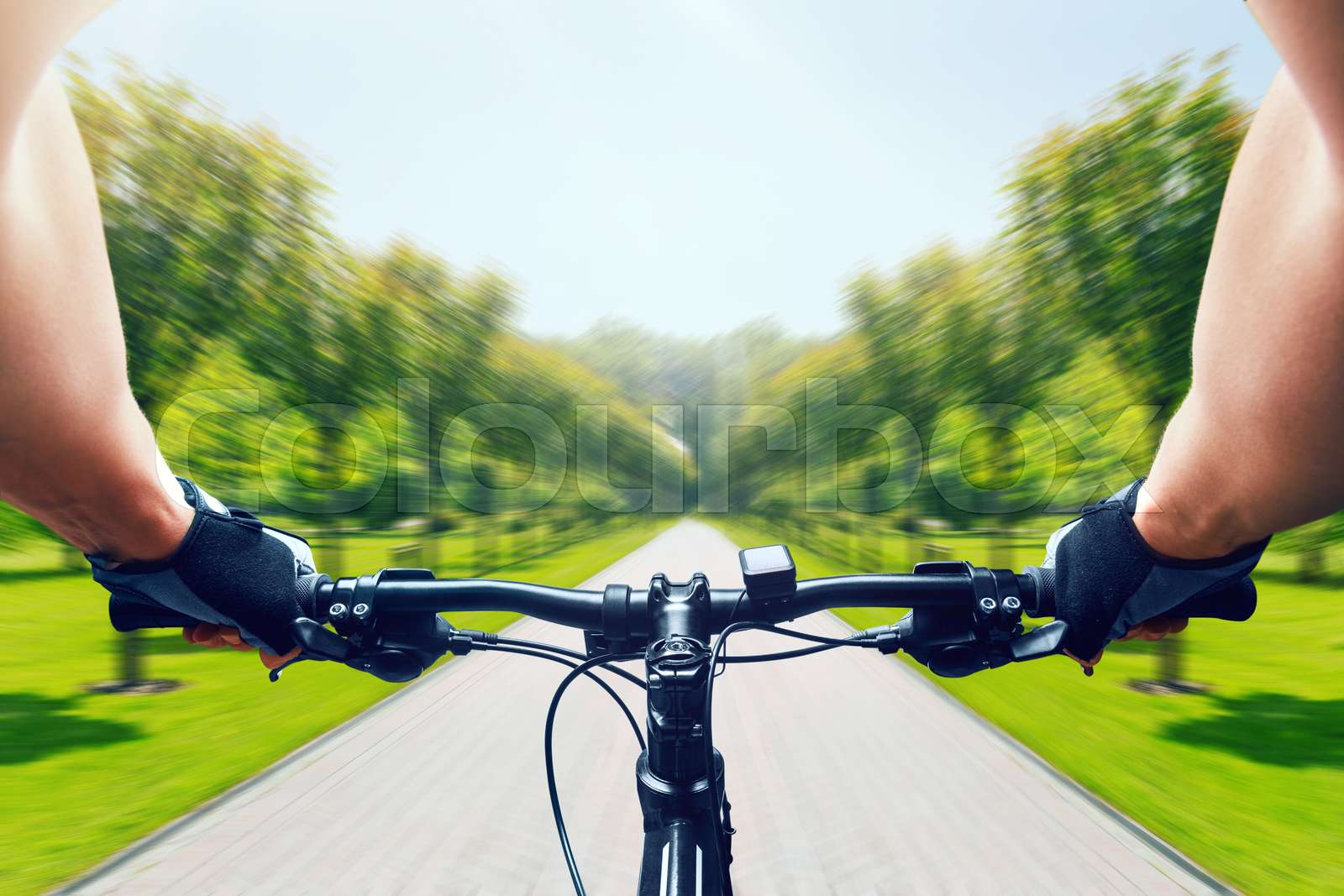 Man riding on bicycle, fast speed, aging effect | Stock image | Colourbox