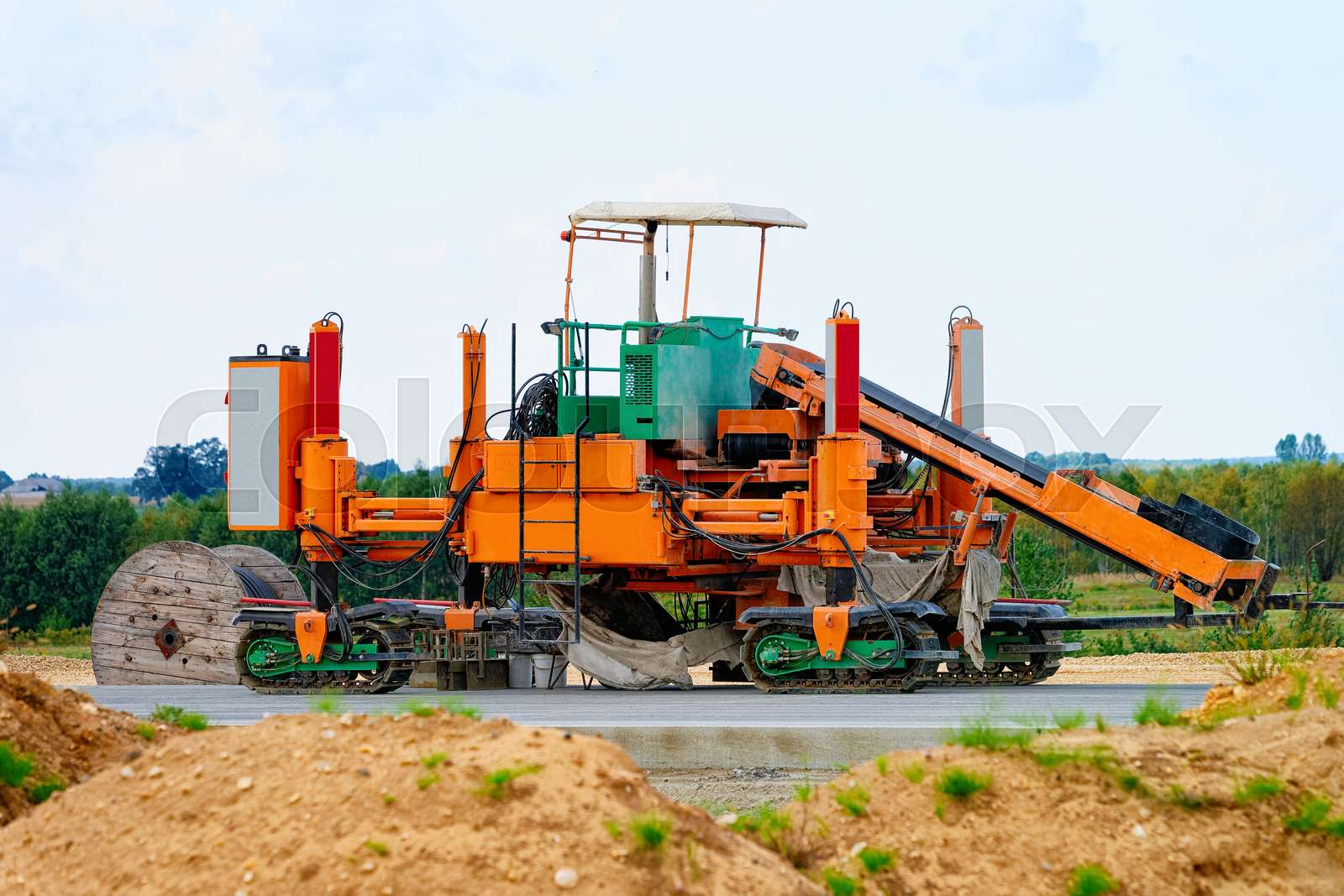 Road milling machine on highway road in Poland | Stock image | Colourbox