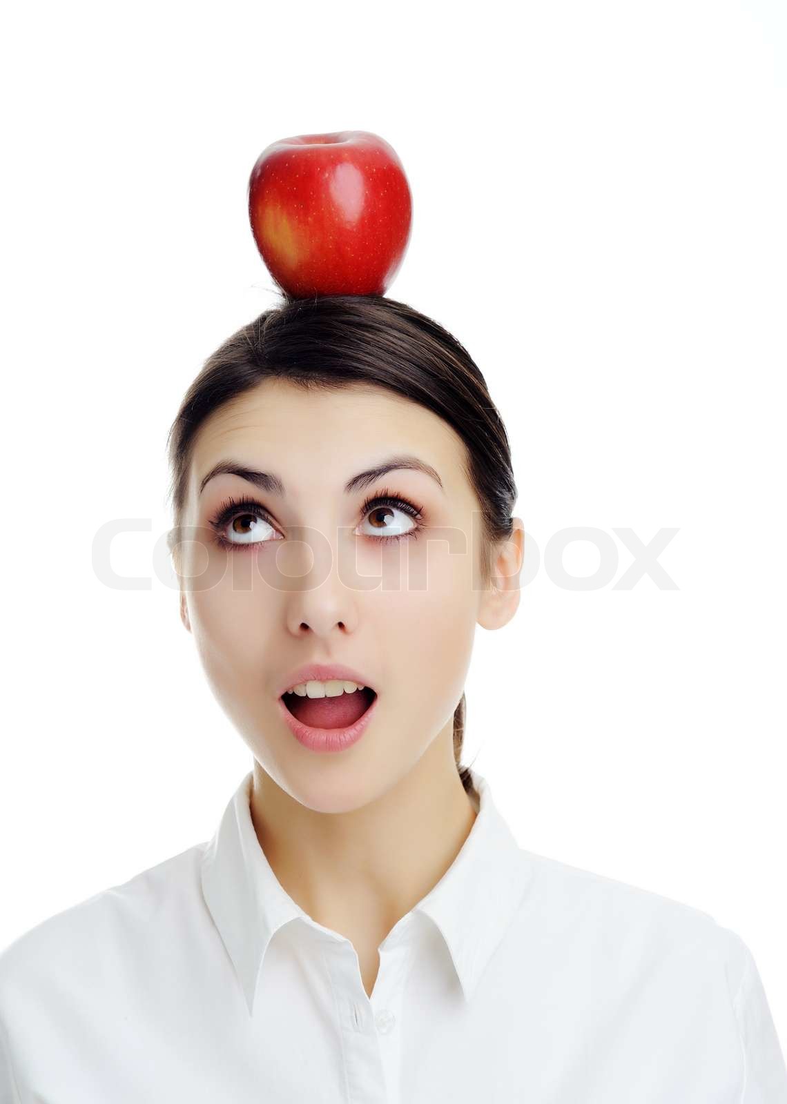 Red apple on head | Stock image | Colourbox