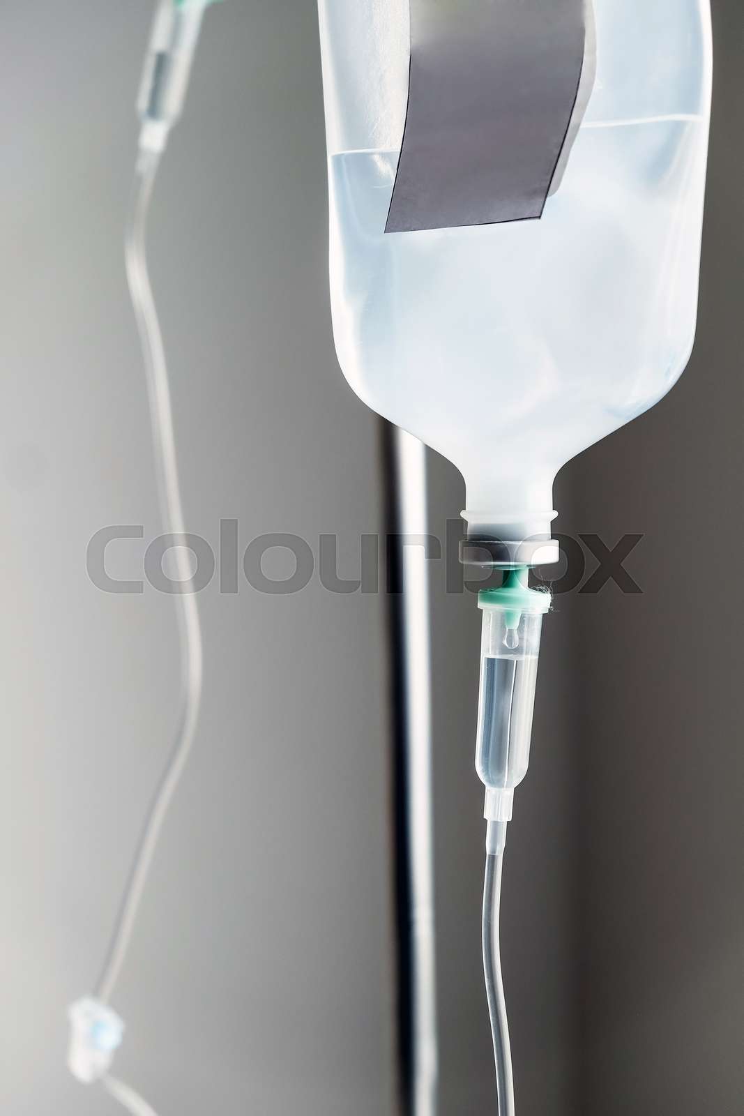 IV saline solution drip for patient | Stock image | Colourbox