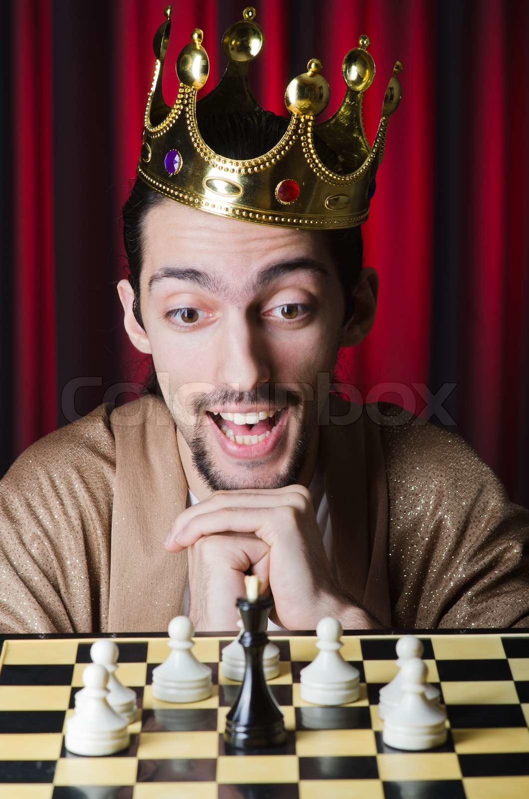 Chess player playing his game | Stock image | Colourbox