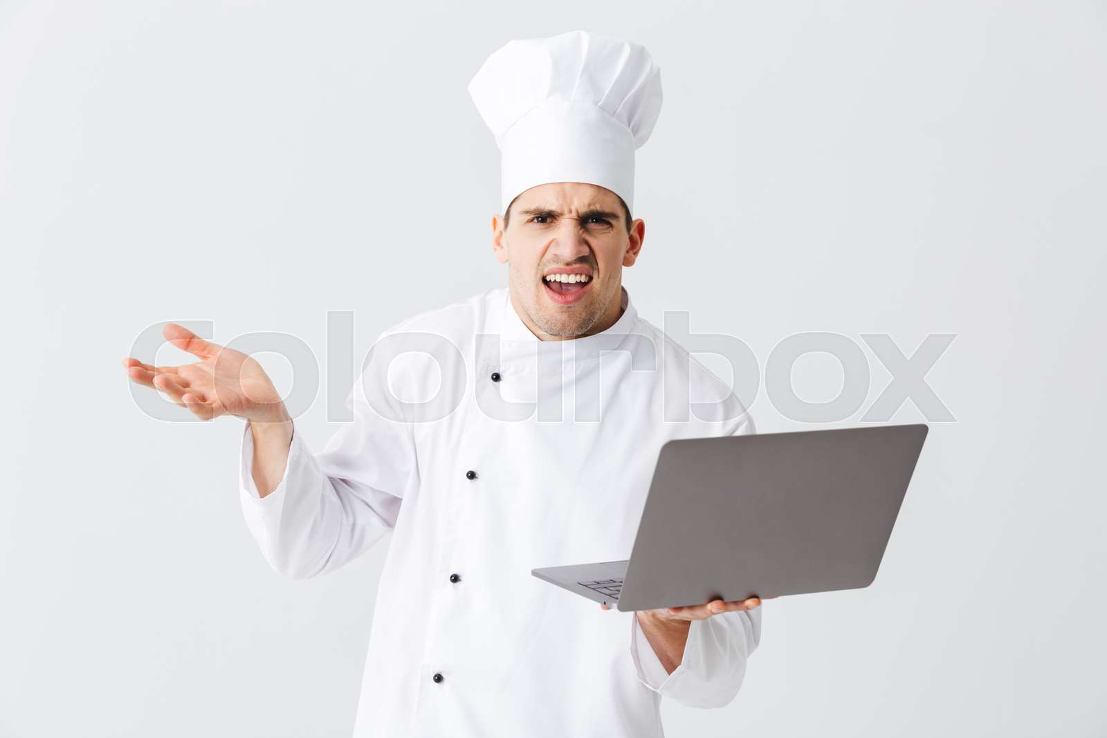 Confused chef cook wearing uniform | Stock image | Colourbox