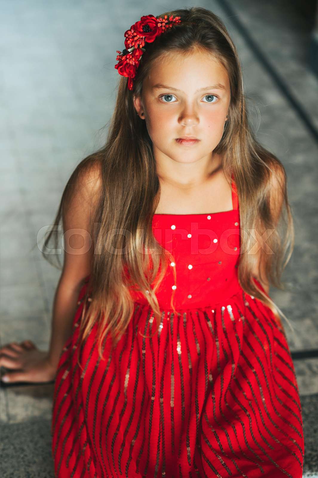 Portrait of young girl model wearing red dress | Stock image | Colourbox