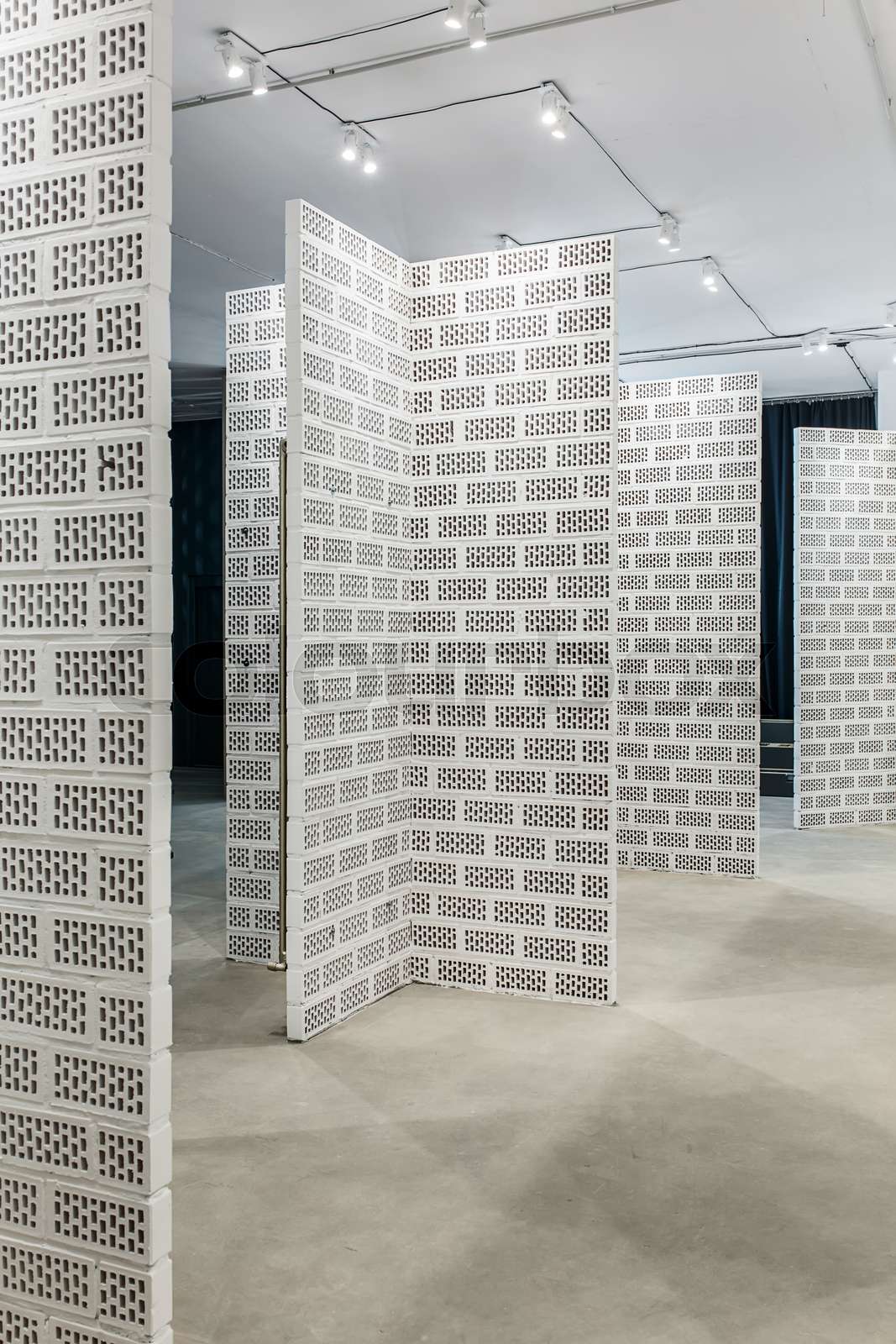 Several white brick partitions in the office in a loft style | Stock ...