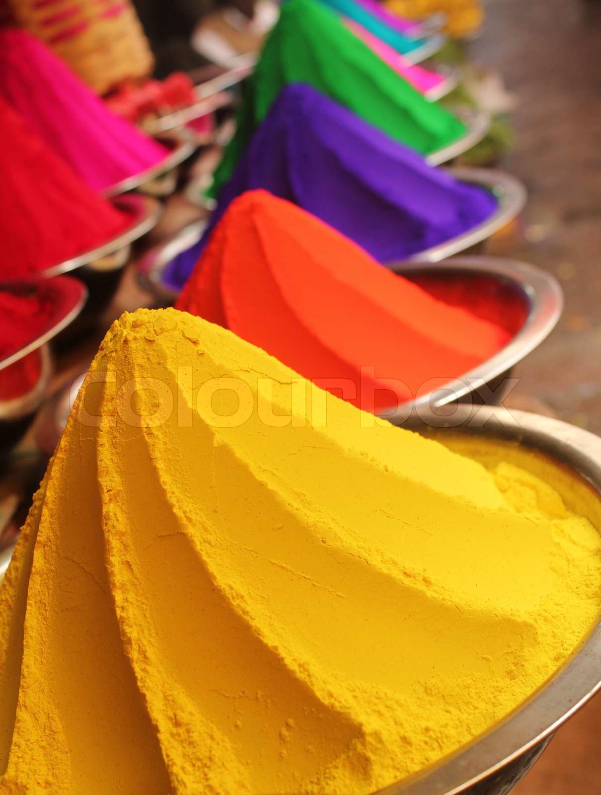 Colorful piles of powdered dyes on display | Stock image | Colourbox