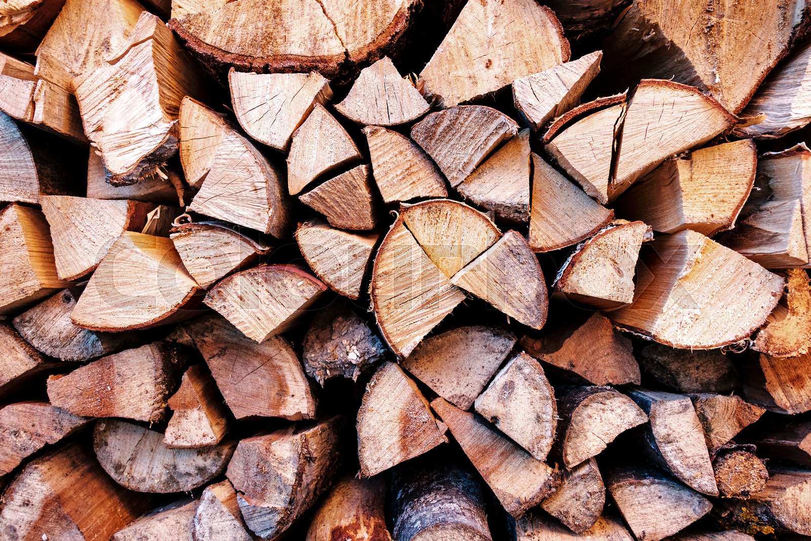 Background texture of chopped wood in a stack | Stock image | Colourbox