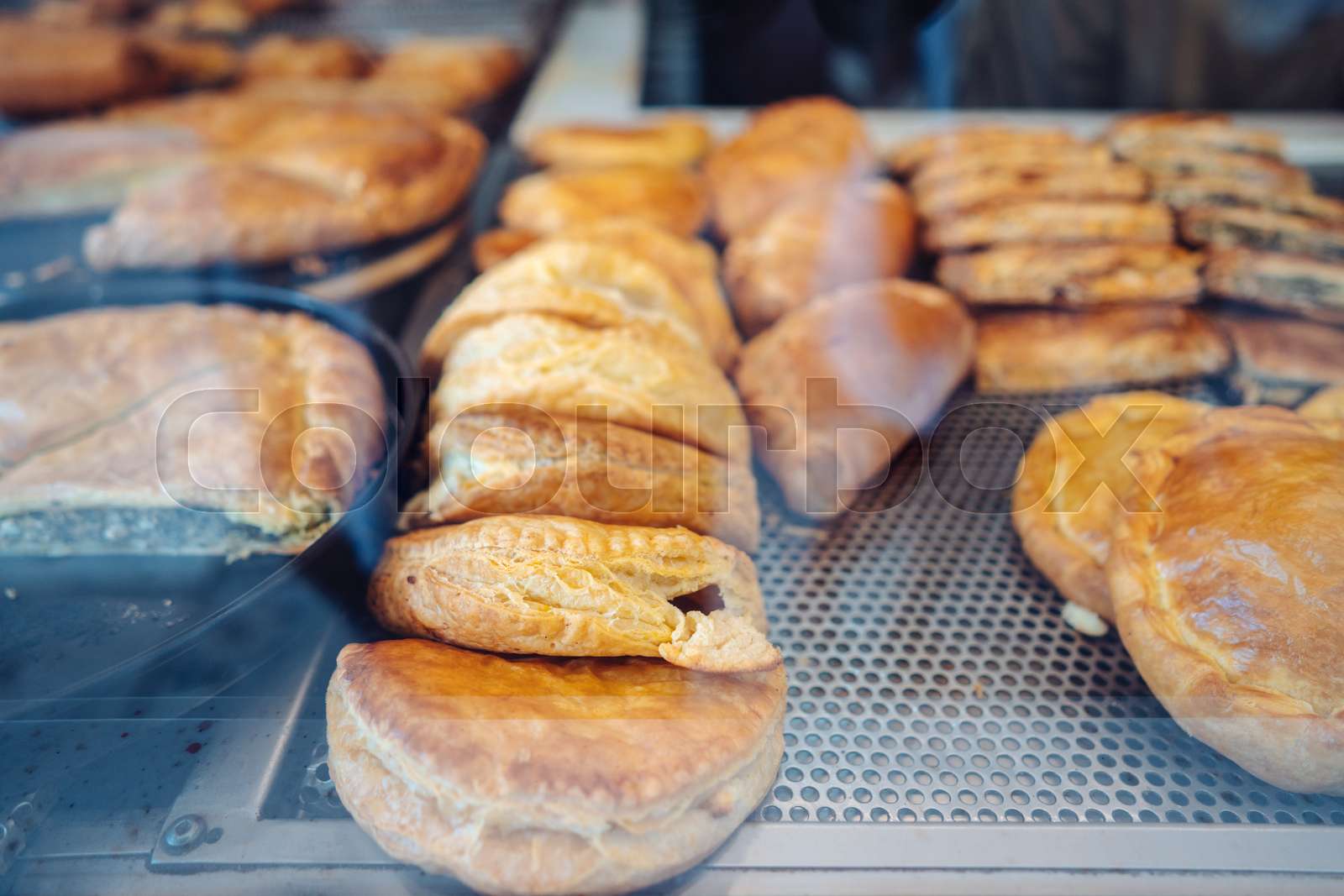 Fresh bakery in showcase of a street shop bakery food. | Stock image ...