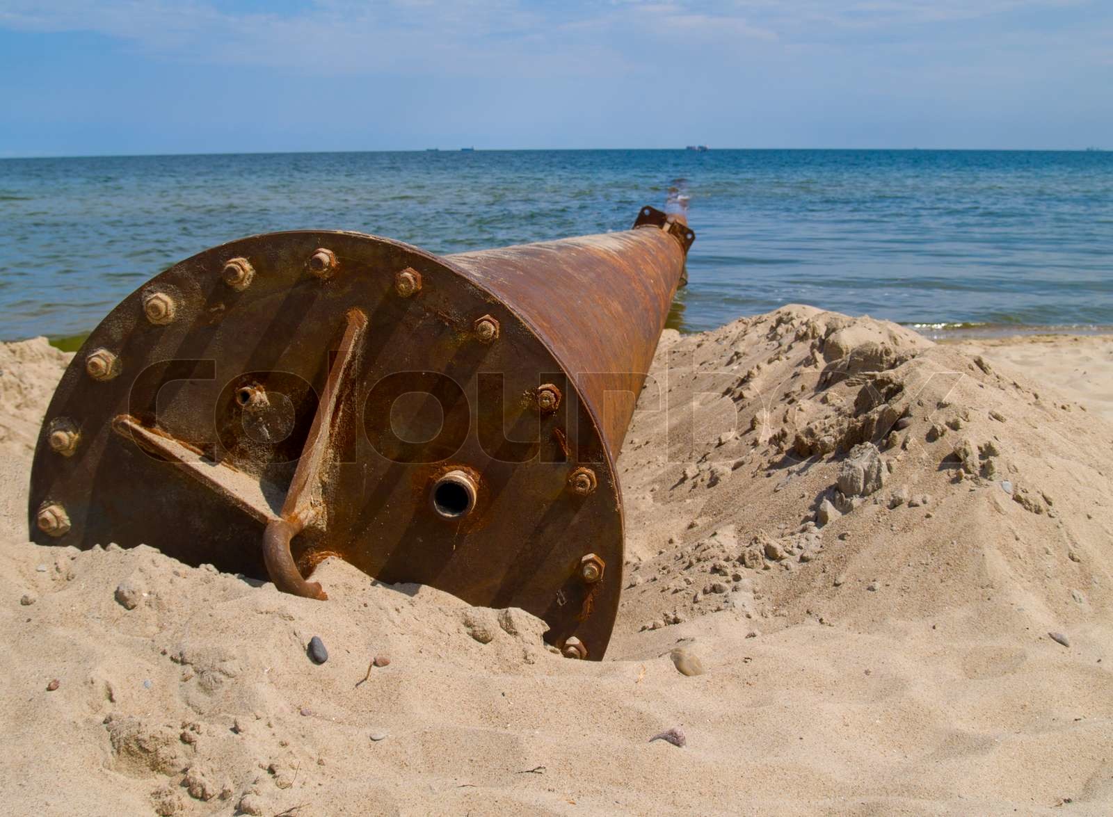 rusted pipe in sea | Stock image | Colourbox