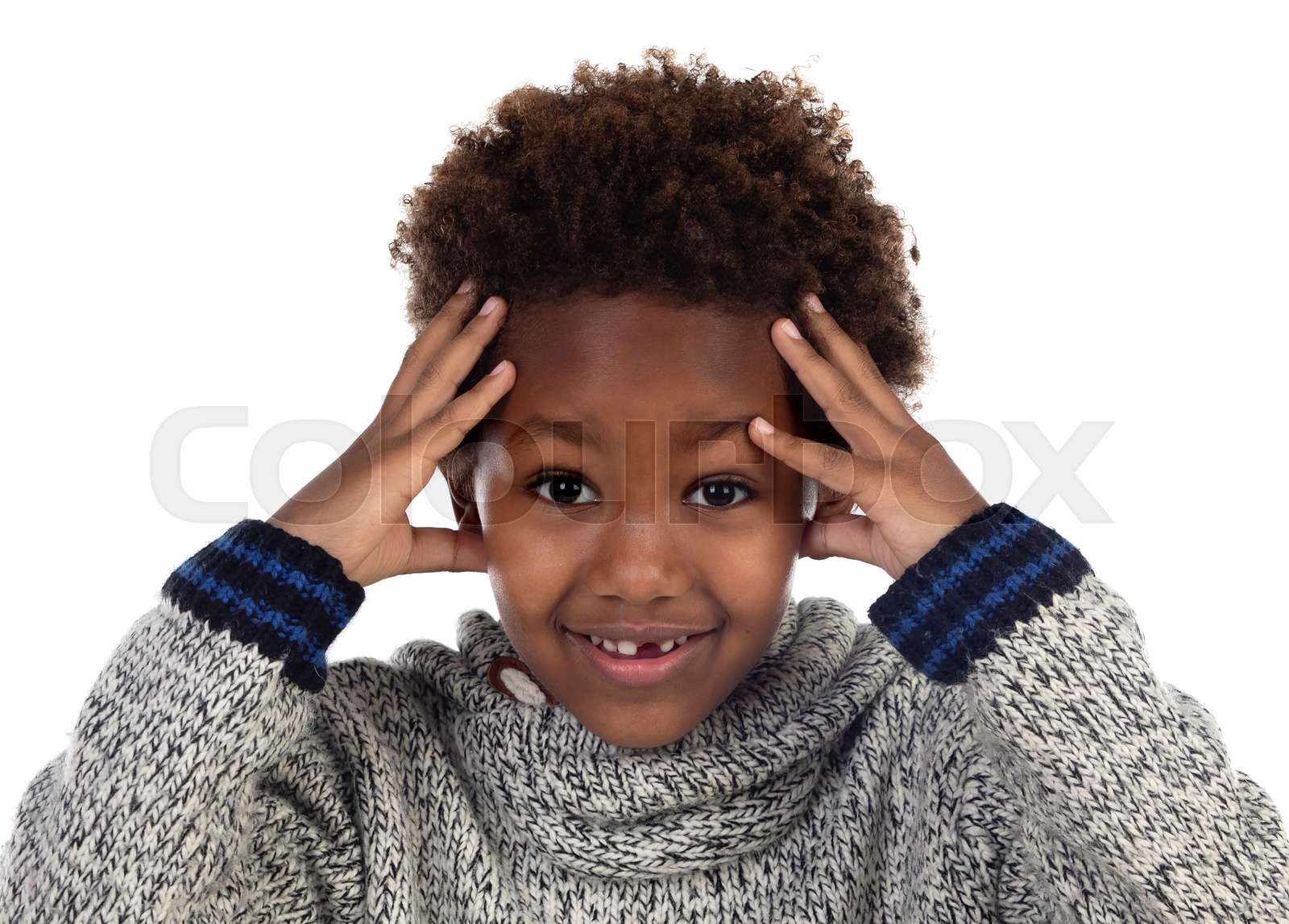African child covering his head | Stock image | Colourbox