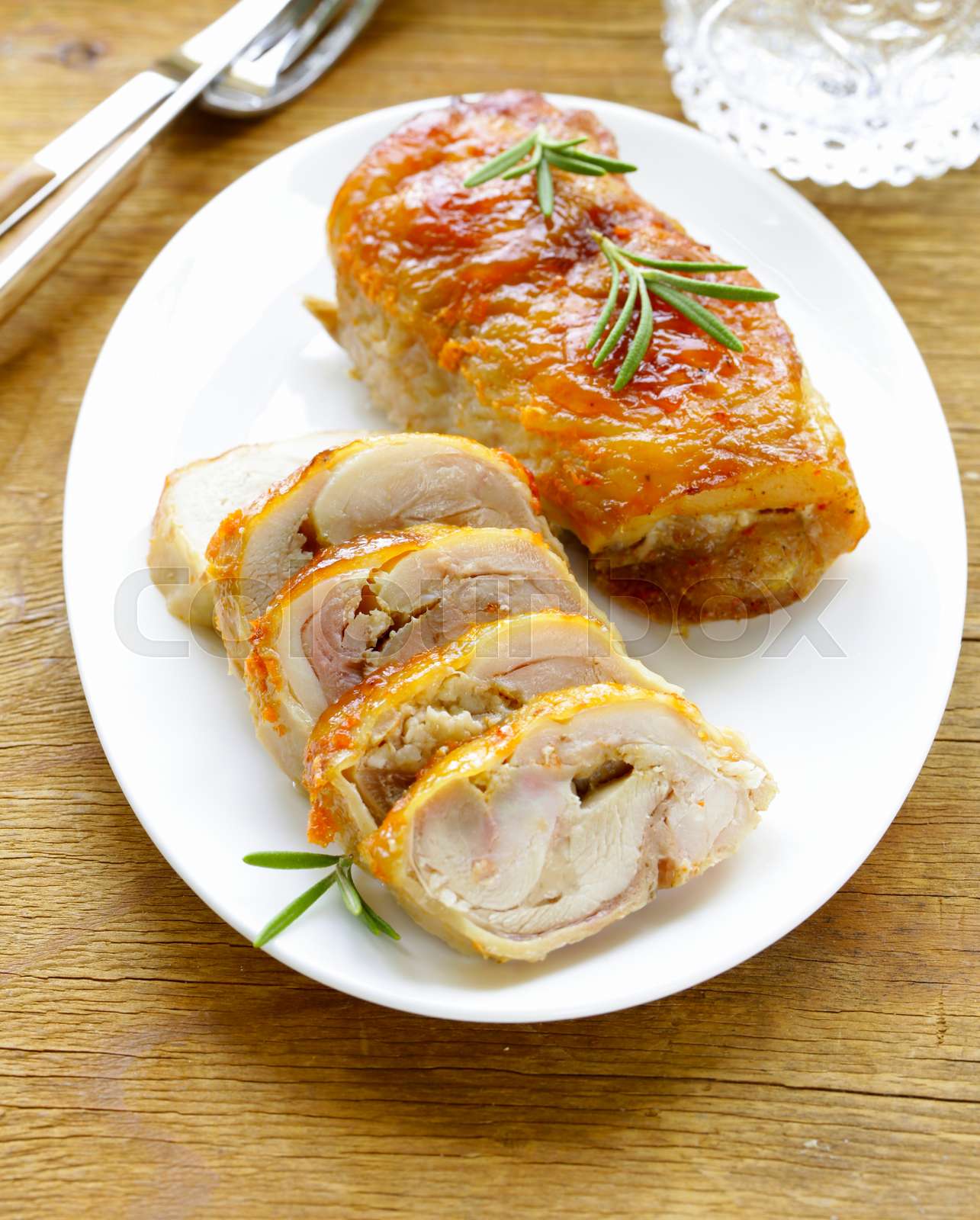 Baked chicken roulade with garlic and rosemary | Stock image | Colourbox