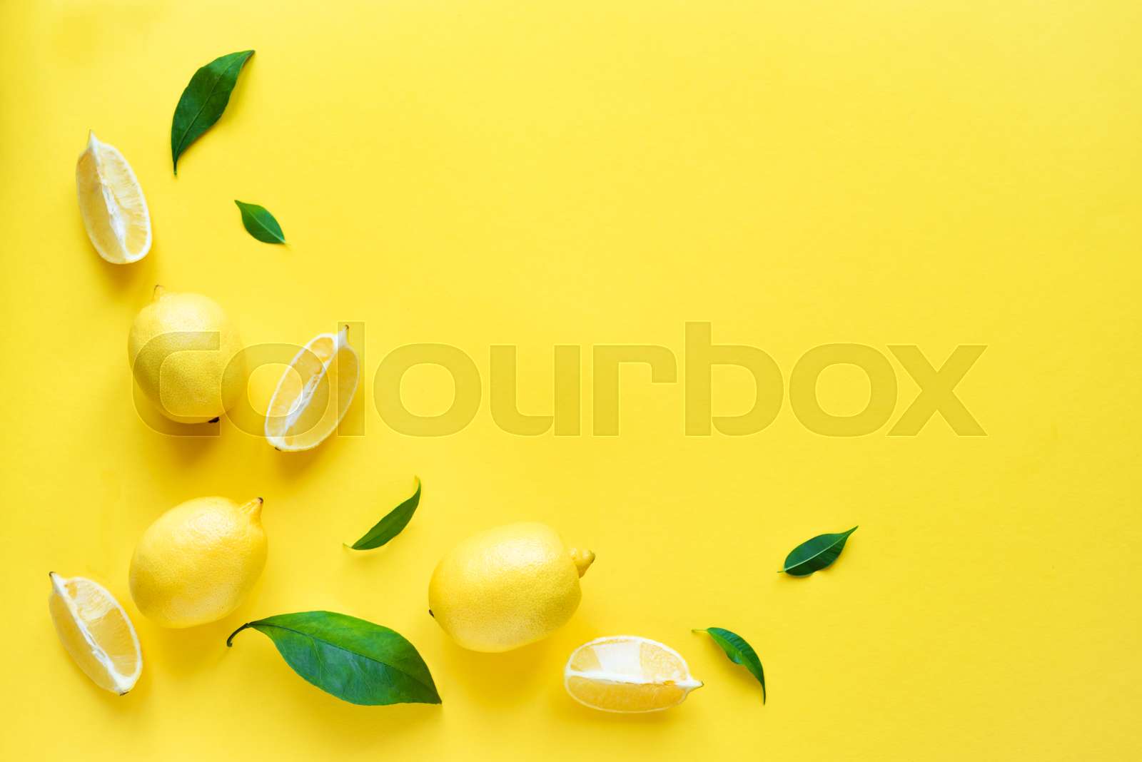 Lemons on yellow | Stock image | Colourbox