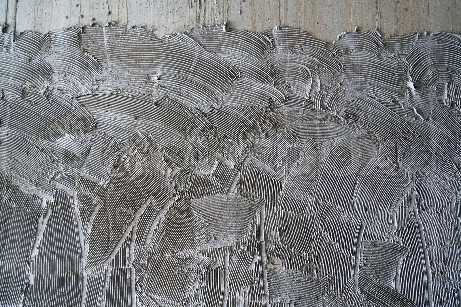 concrete wall comb surface prepared for tiling | Stock image | Colourbox