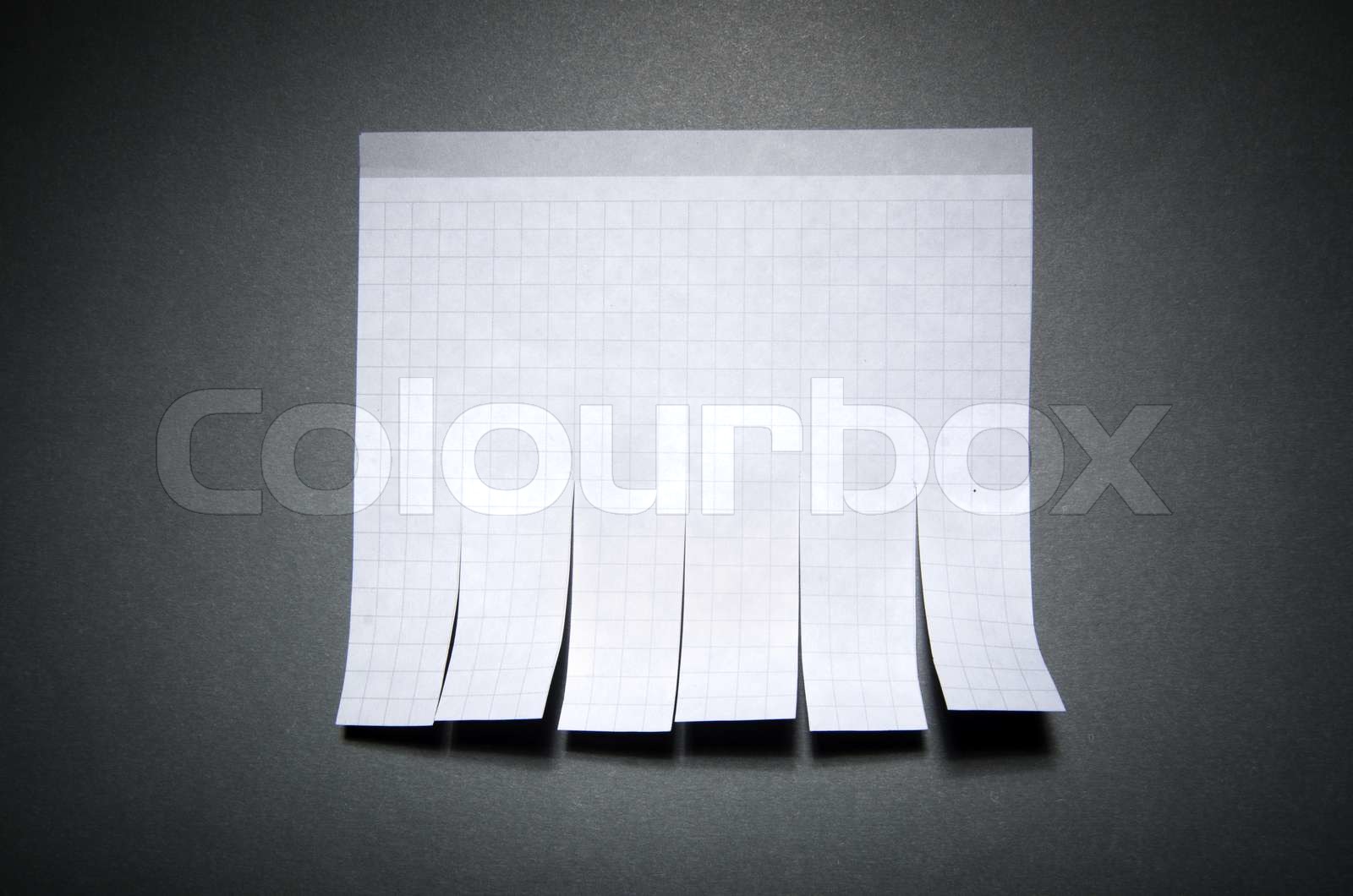 Tear off paper notice on the wall | Stock image | Colourbox