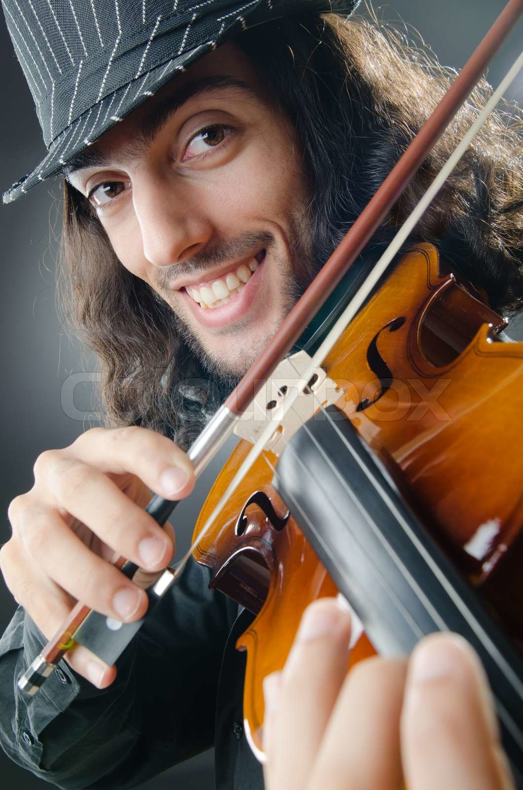 Fiddler playing the violin | Stock image | Colourbox