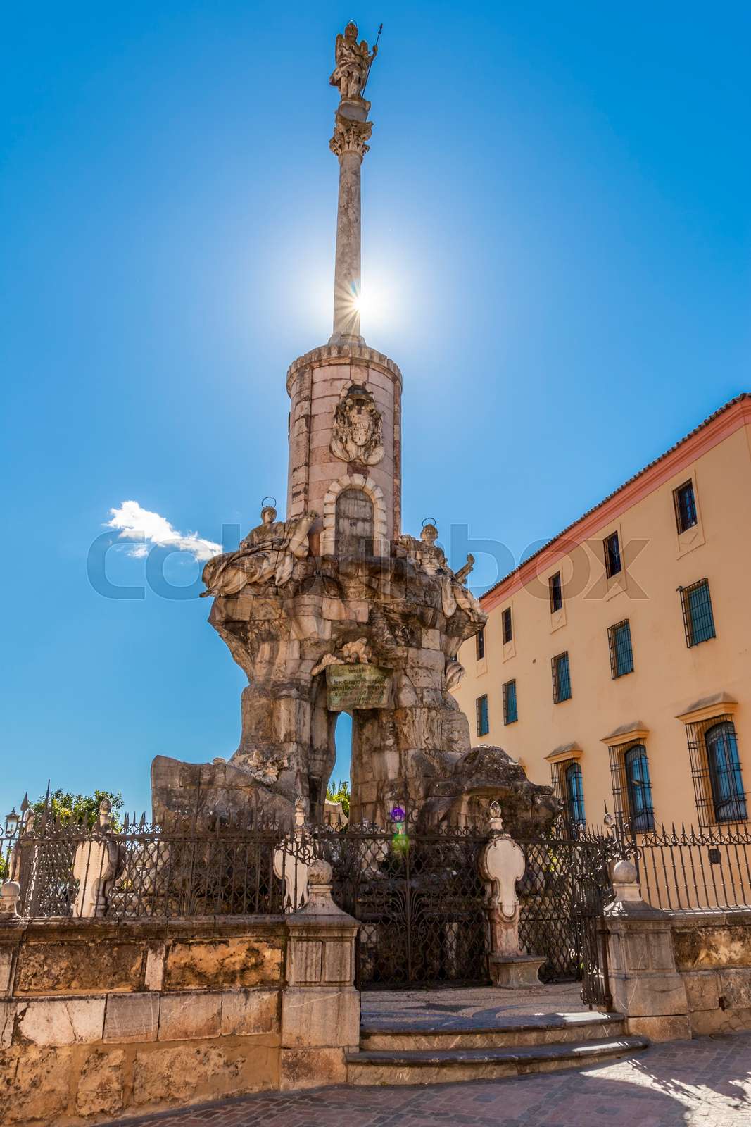 Beautiful medieval column on square in sunlight | Stock image | Colourbox