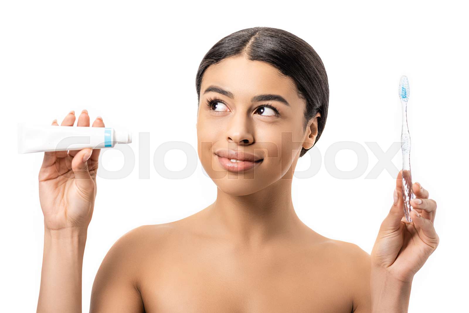 Smiling Naked African American Girl Holding Toothpaste And Toothbrush