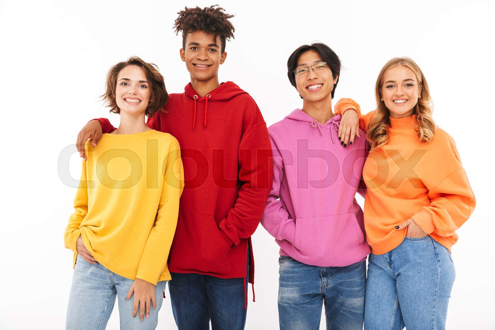 Group of cheerful multiracial friends standing isolated | Stock image ...